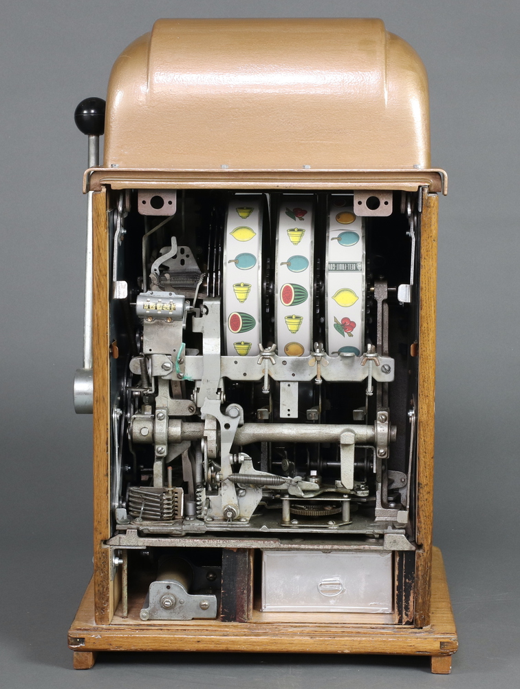 A restored and refurbished iron Mills One Armed Bandit 1p fruit machine ...