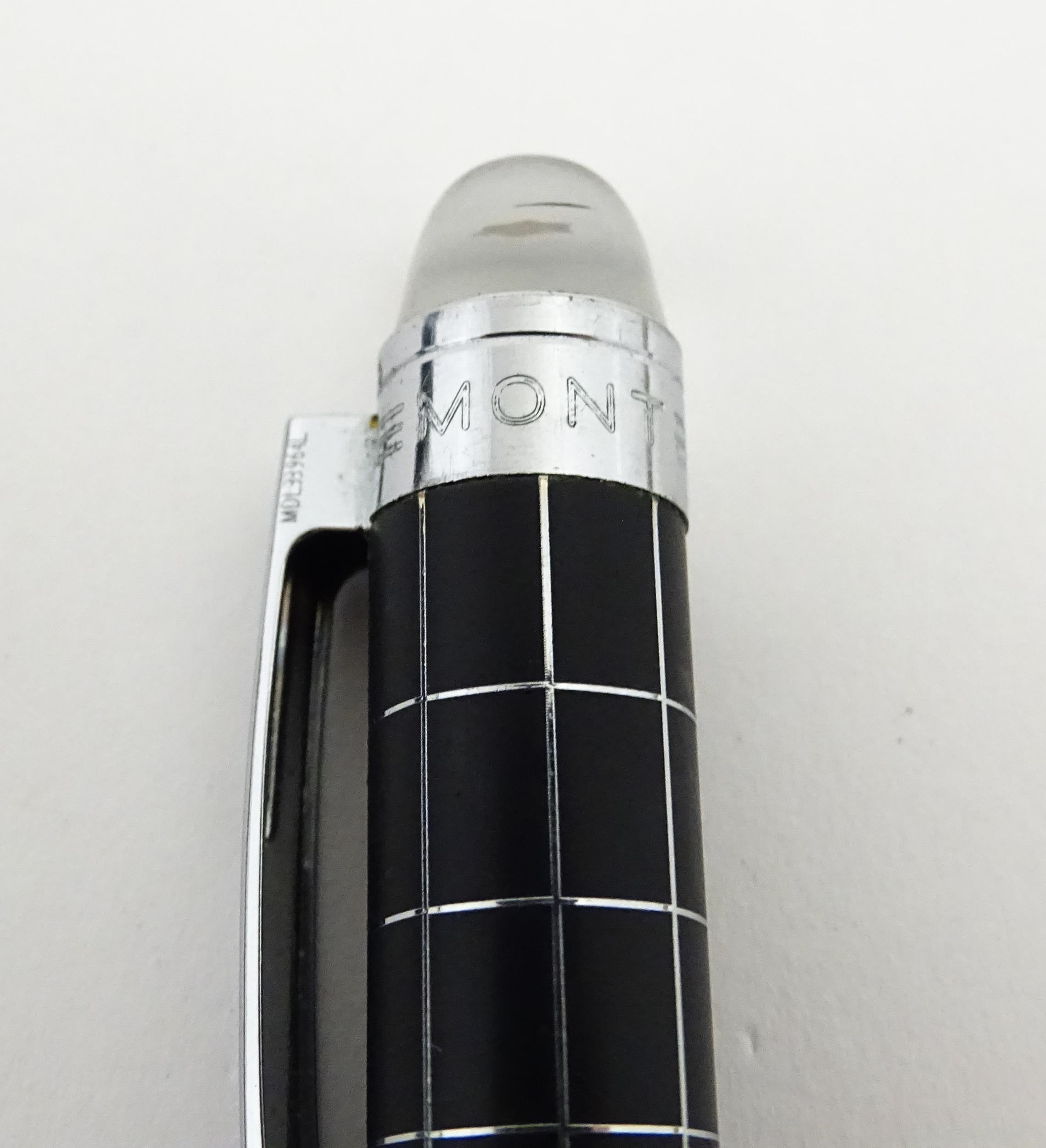 A cased Montblanc StarWalker ballpoint pen, in black finish with linear ...