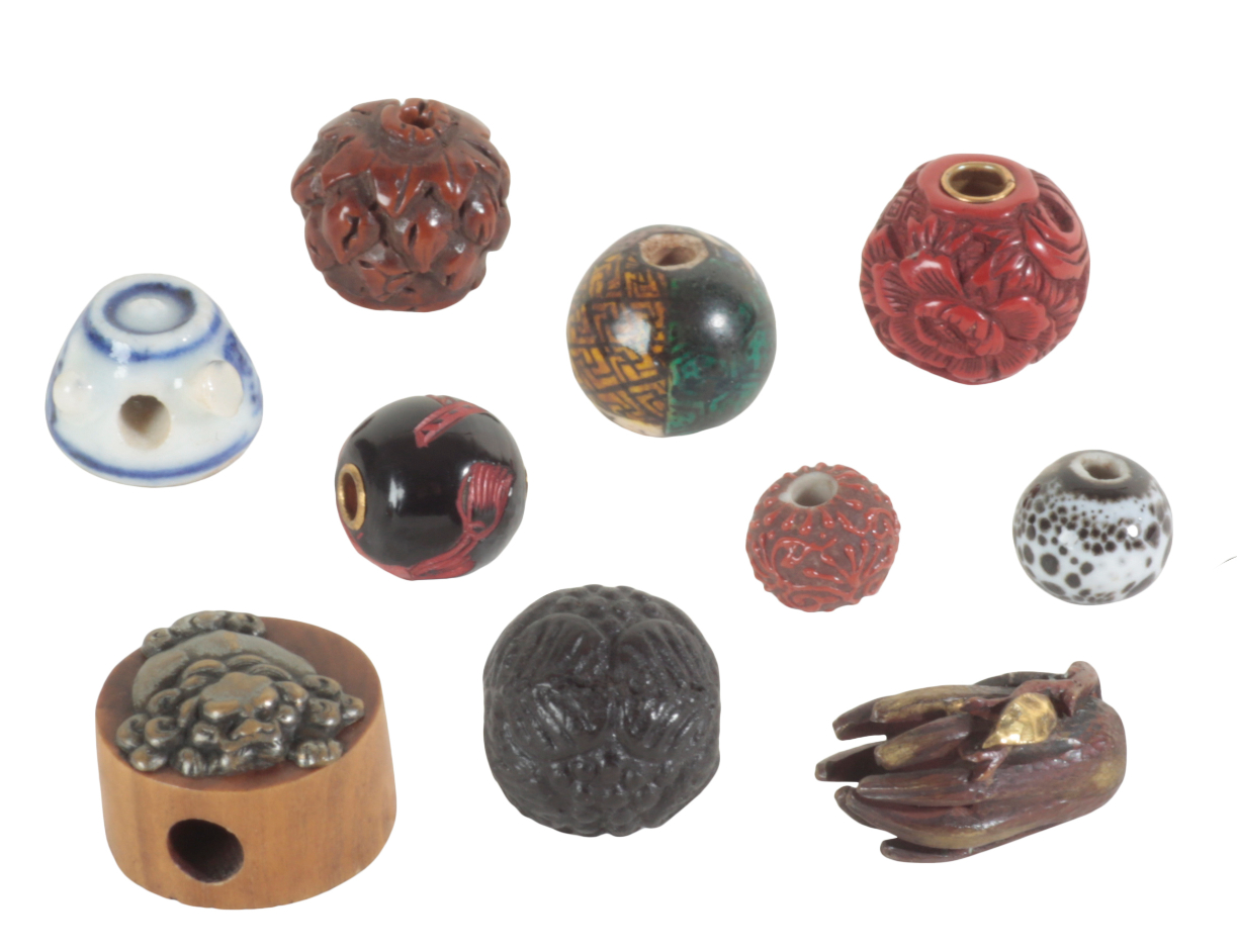 A GROUP OF TEN JAPANESE OJIME including lacquer and porcelain examples ...