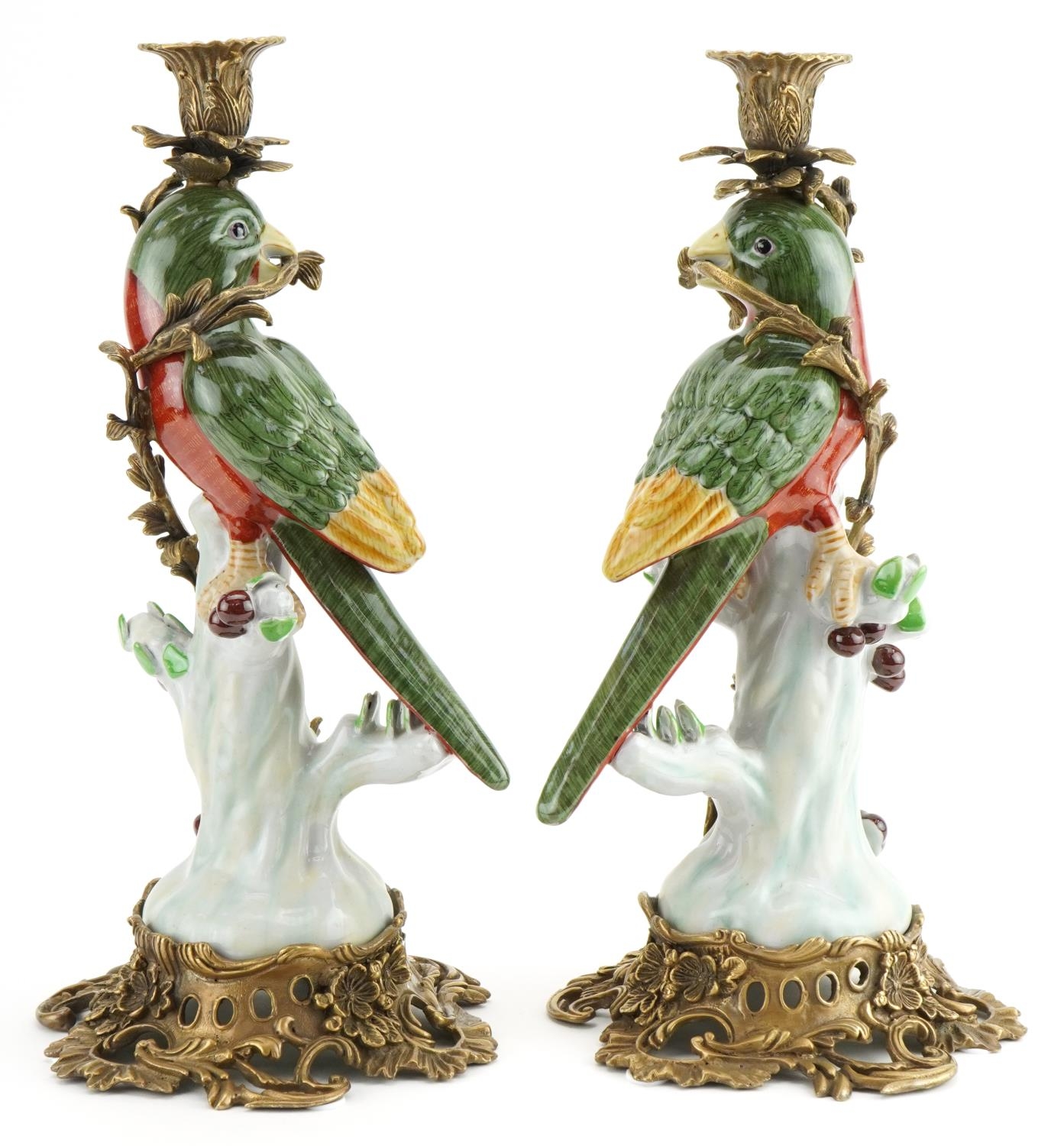 Pair of continental porcelain bird design candlesticks with gilt bronze ...