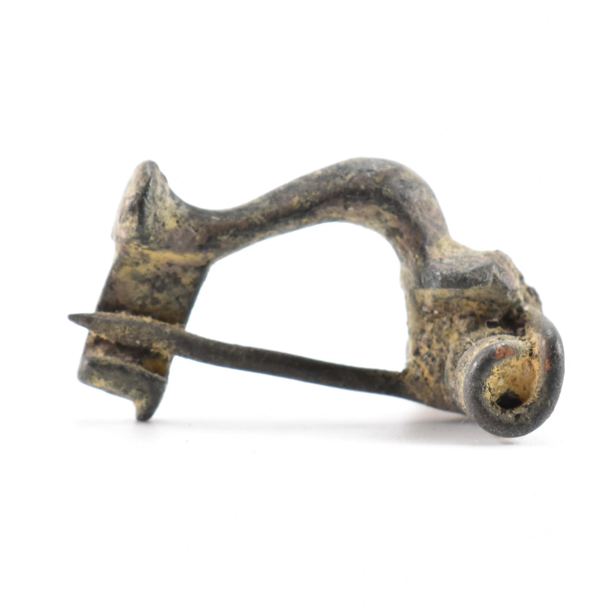 Antiquities - A roman fibula dolphin / knee brooch having a straight ...