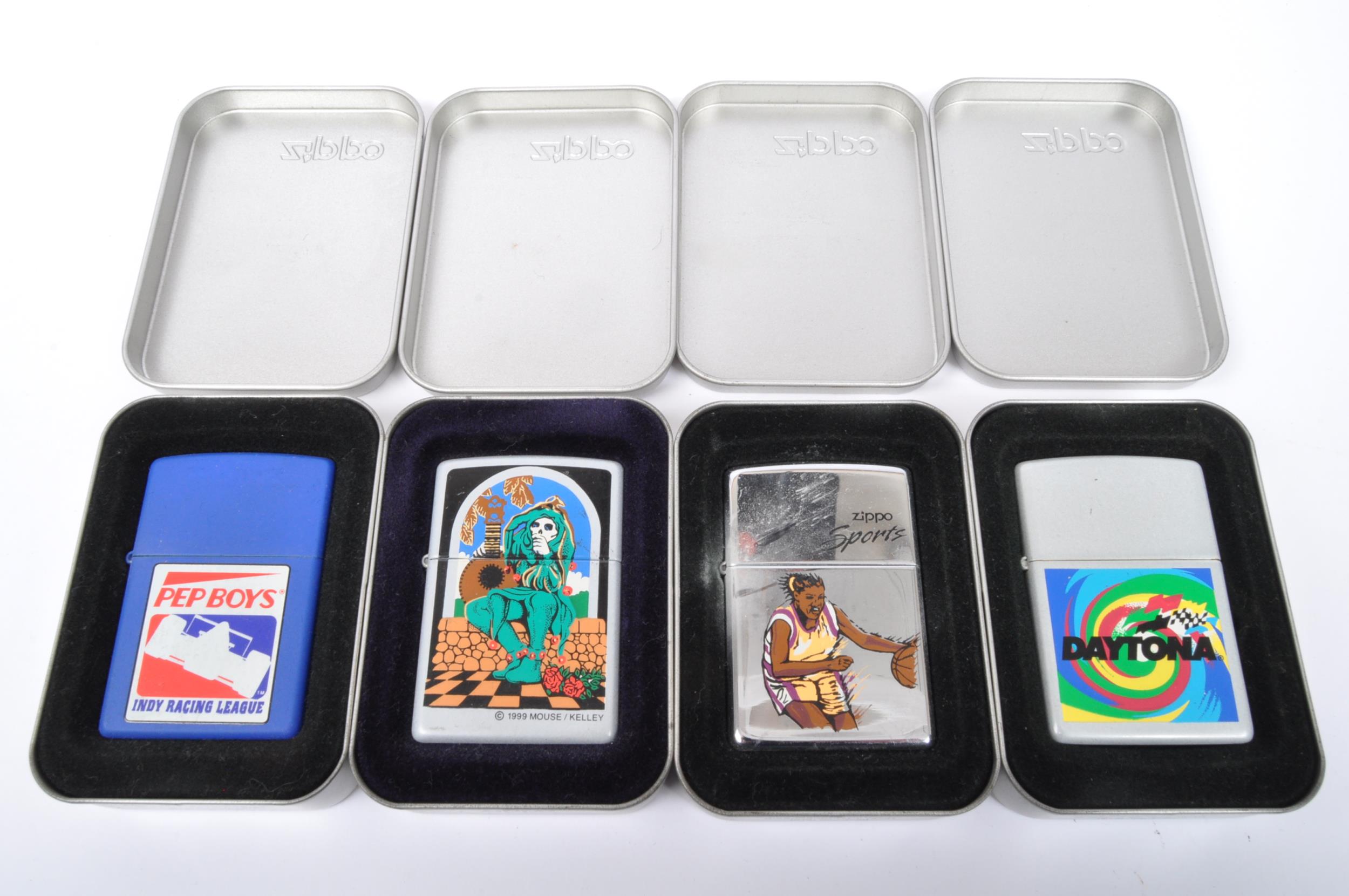 A collection of NOS New Old Stock tinned cased cigarette lighters to ...