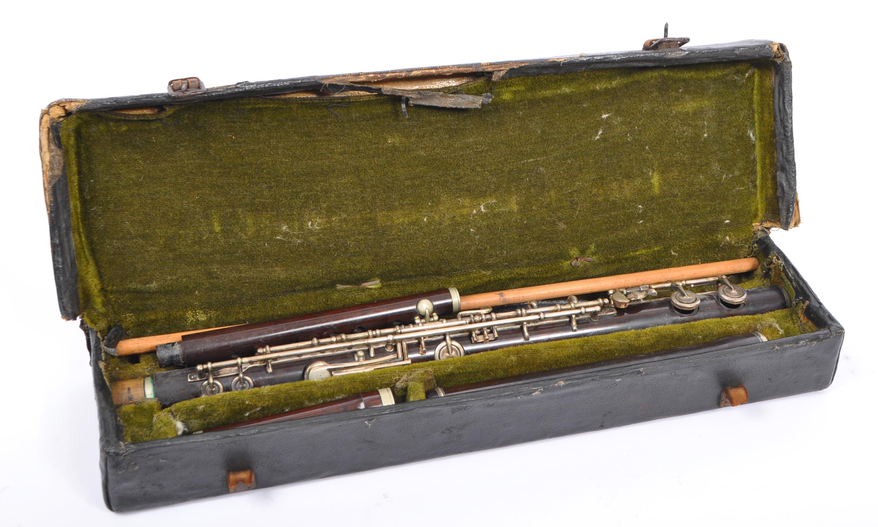MUSICAL INSTRUMENTS: A mid 20th century cased 'John Grey & Sons ...