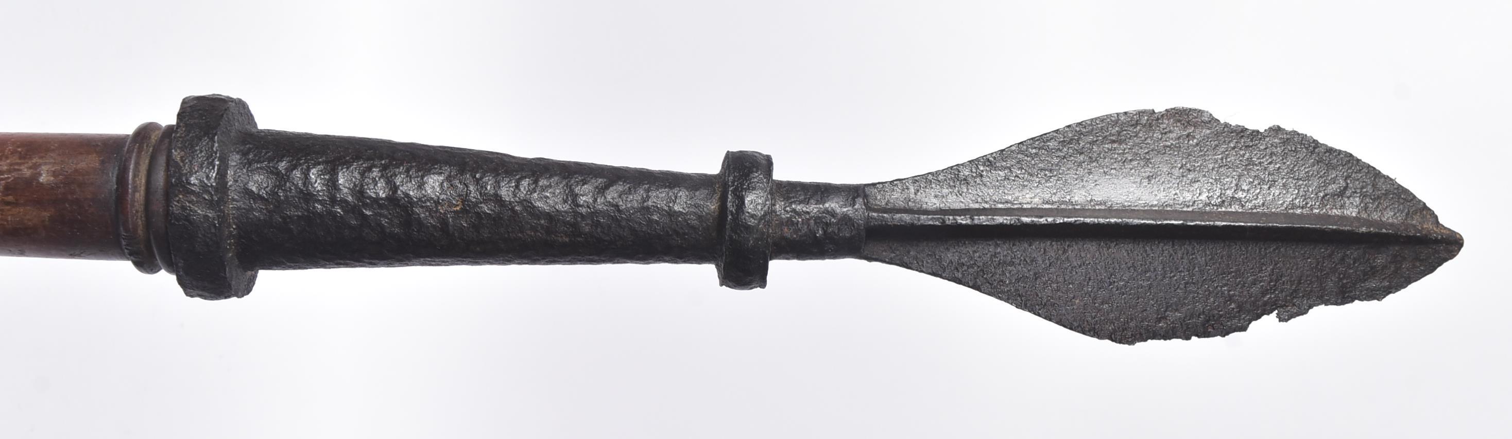 An early 19th Century British Navy polearm. Turned wooden shaft with a ...