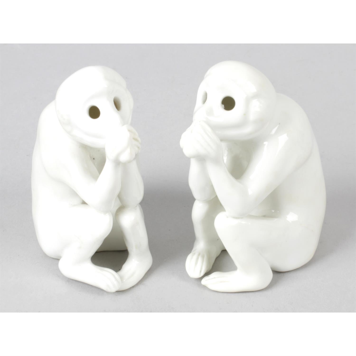Two Bernard Moore pottery figures, each modelled as a monkey seated and ...