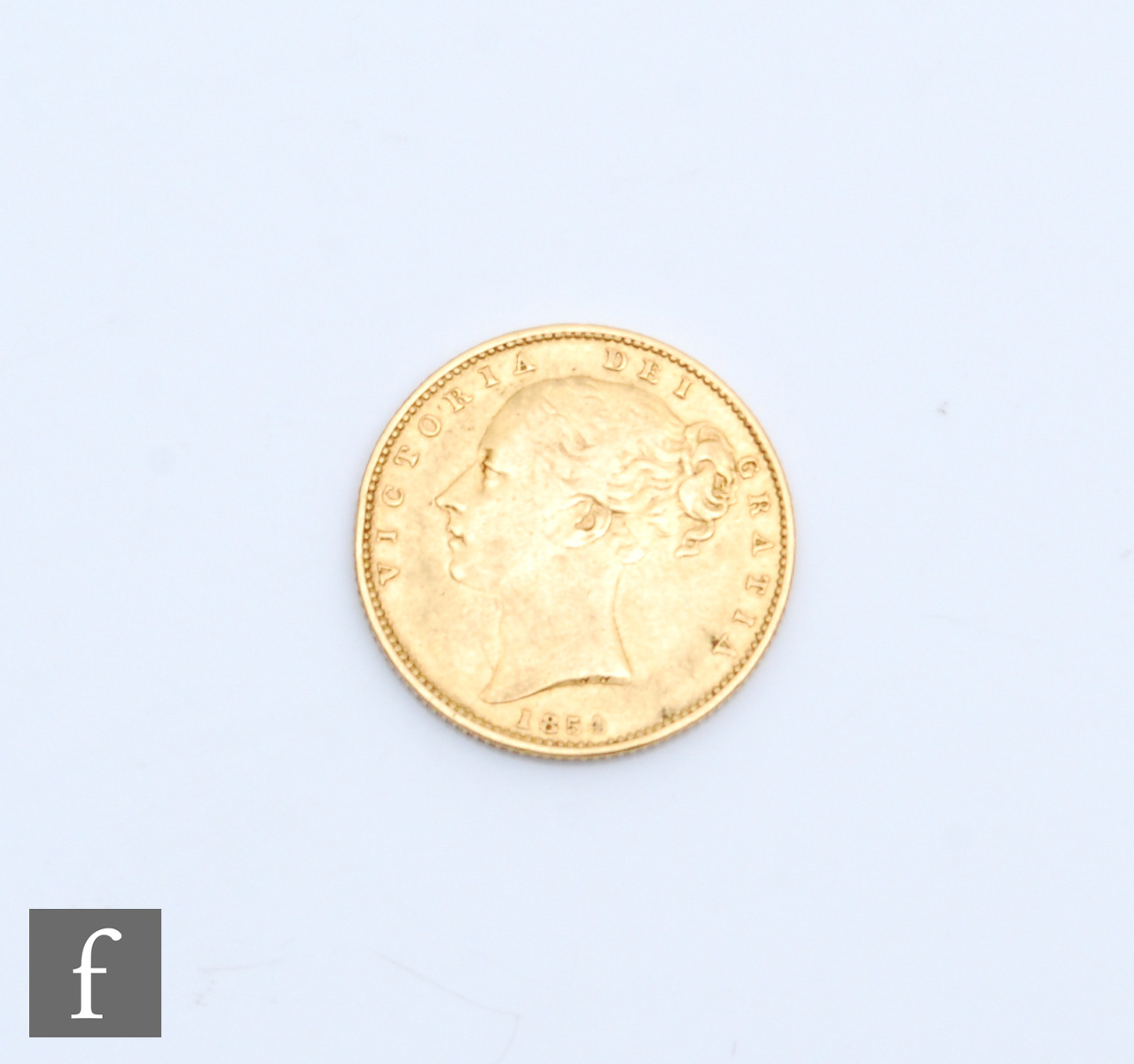 A Victorian shield back full sovereign, dated 1854.