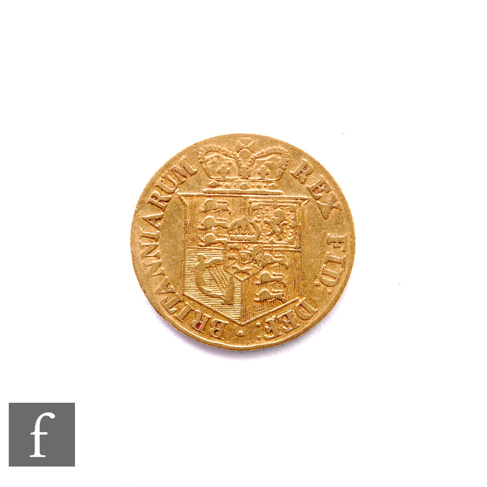 George III (1760-1820) - A half sovereign, 1817, laureate head, reverse ...