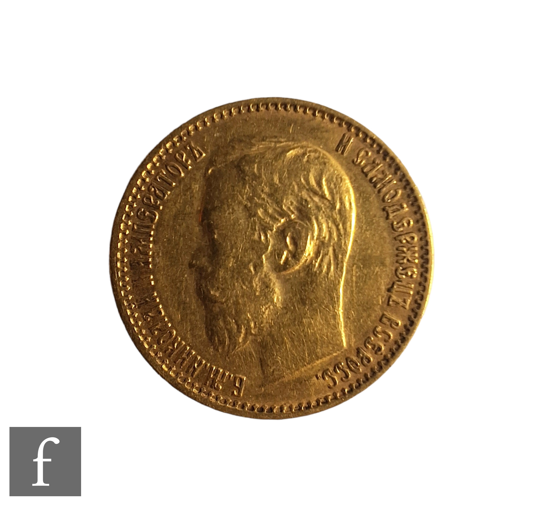 A Nicholas II of Russia (1895-1911) five roubles gold coin, 1889, 4.3g.