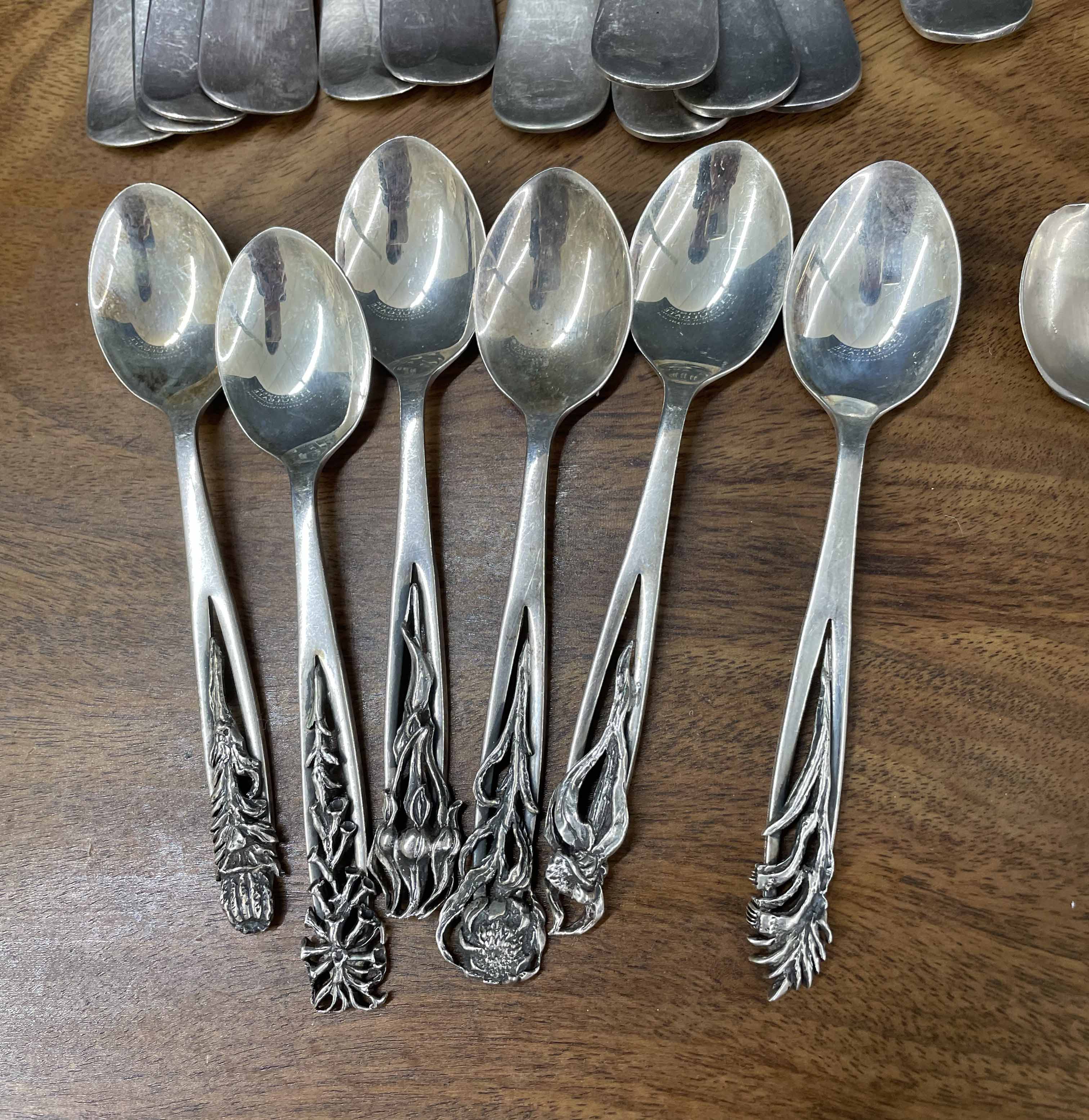 Set of six Australian silver wildflower finial coffee spoons, marked ...