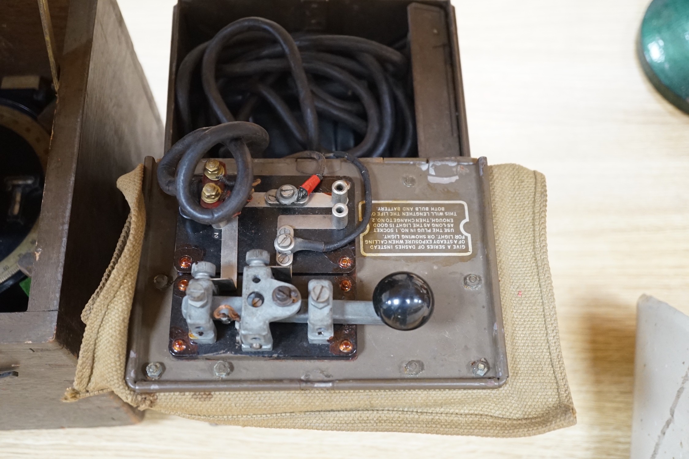 A WW2 range-finder, 33cms wide x 33cms high, together with a morse code ...
