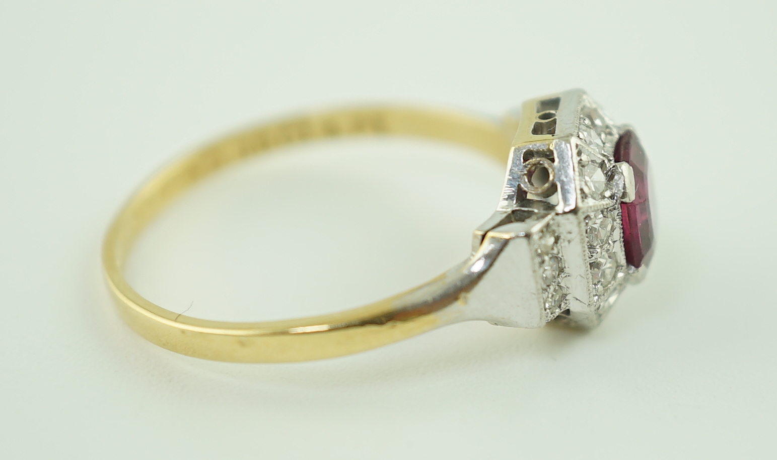 A 1950's Art Deco 18ct gold and platinum, ruby and millegrain set ...