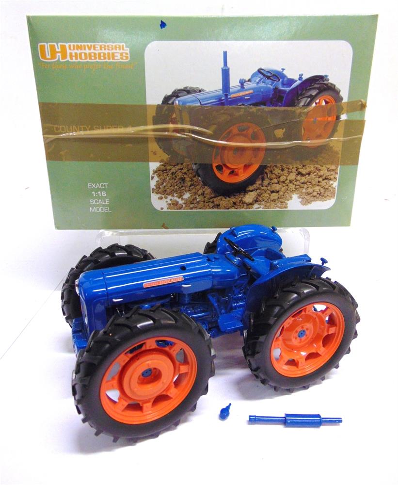 A 1/16 SCALE UNIVERSAL HOBBIES FORDSON COUNTY SUPER 4 blue and orange ...