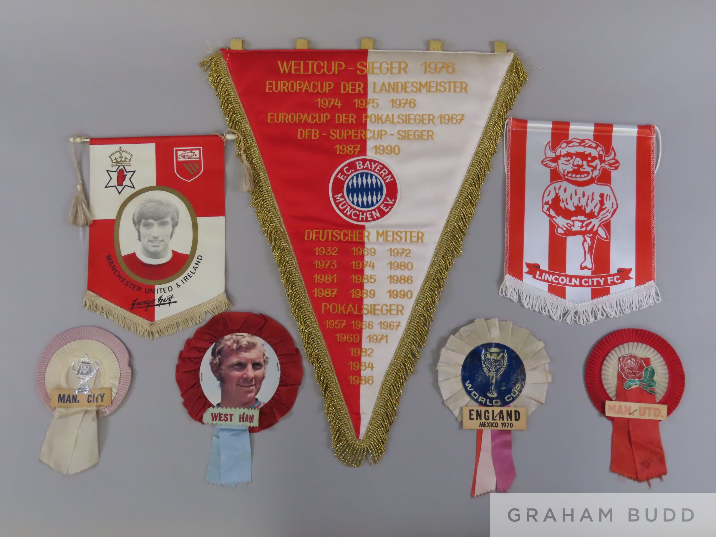A collection of various football pennants and rosettes Including ...