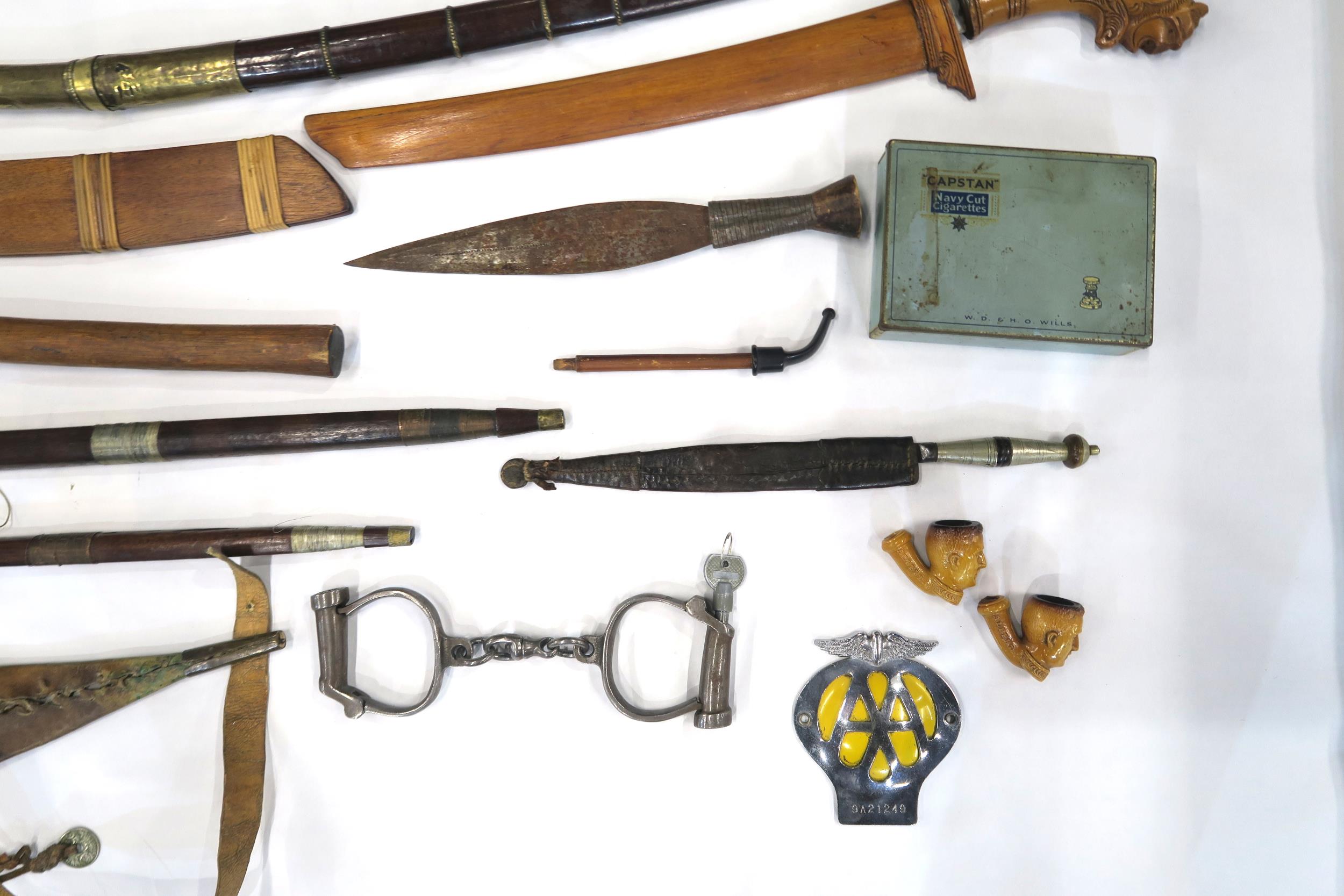 A Burmese dha sword, a Somali Gile, two Sudanese Manding swords and ...