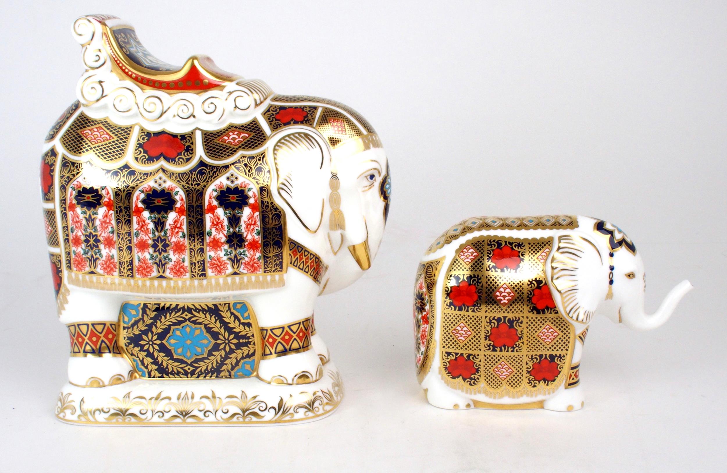 A LARGE ROYAL CROWN DERBY ELEPHANT PAPERWEIGHT modelled with a howdah ...