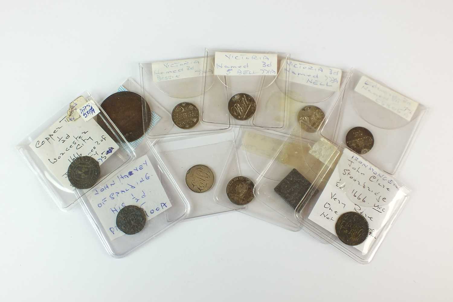 An assorted collection of tradesman's tokens and love tokens, to ...