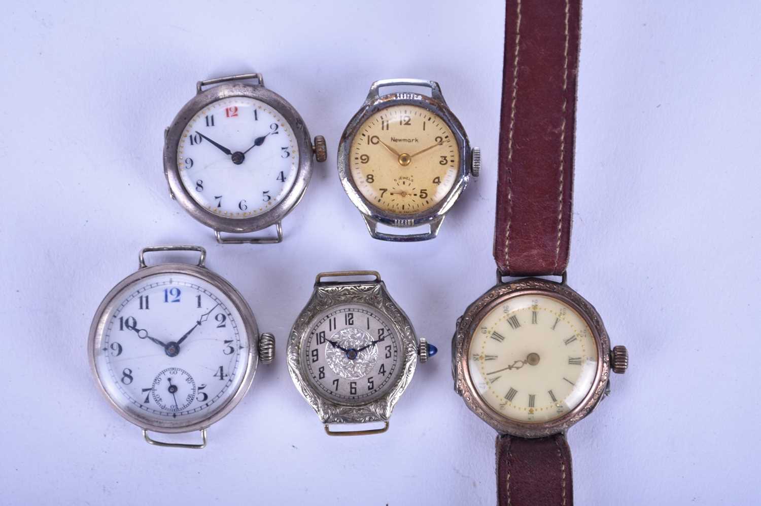A collection of five early 20th century wristwatches, including a ...