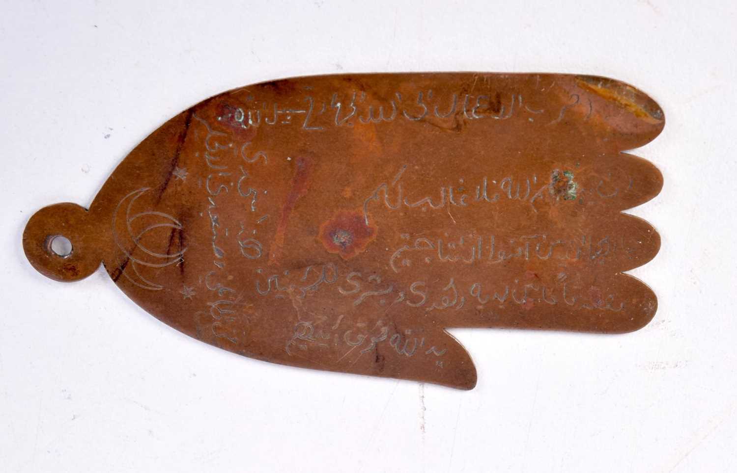 AN UNUSUAL MIDDLE EASTERN HAND OF ALLOY COPPER ALLOY PENDANT. 7.5 cm x ...
