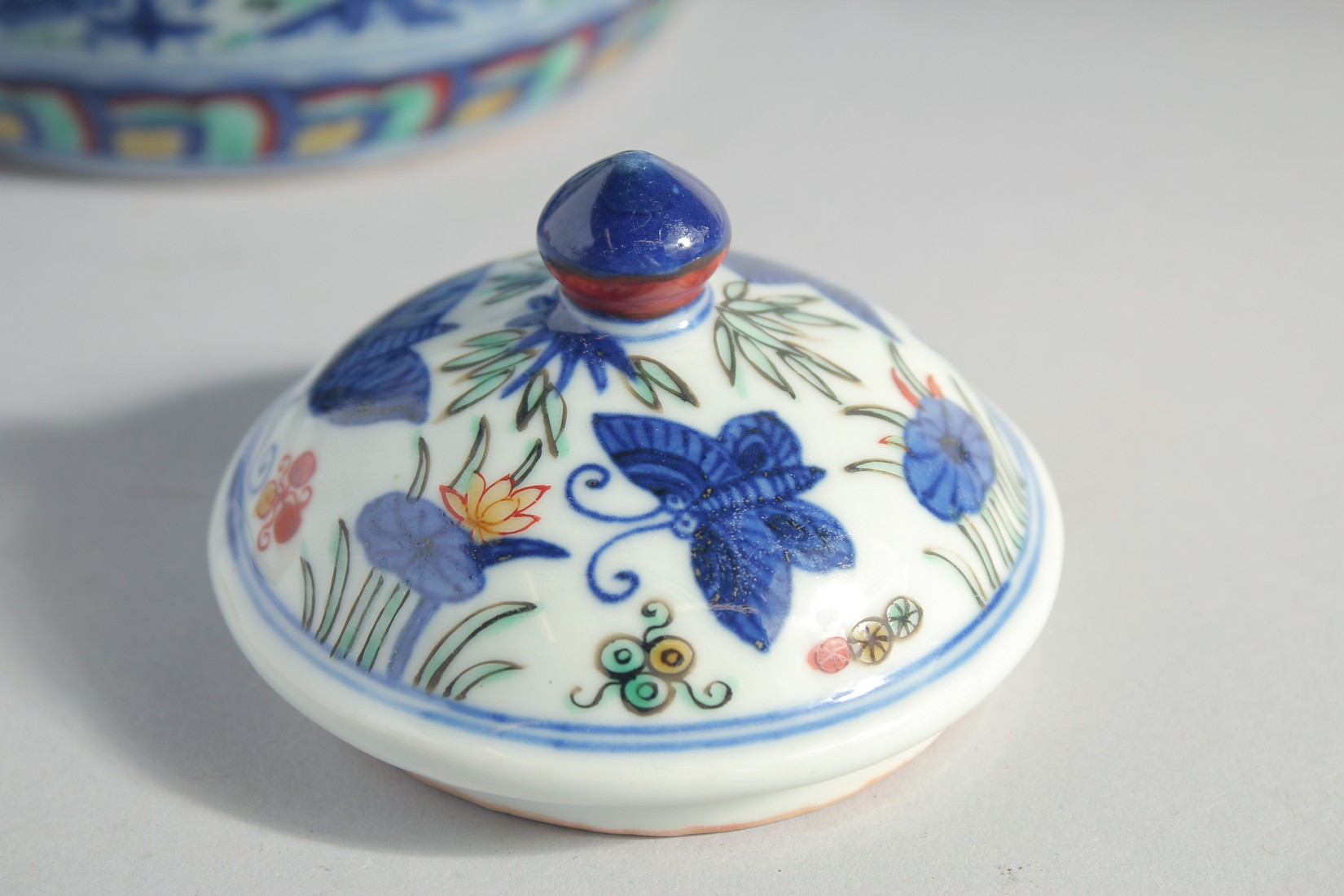 A CHINESE MING STYLE DOUCAI PORCELAIN TEAPOT, painted with cranes and ...