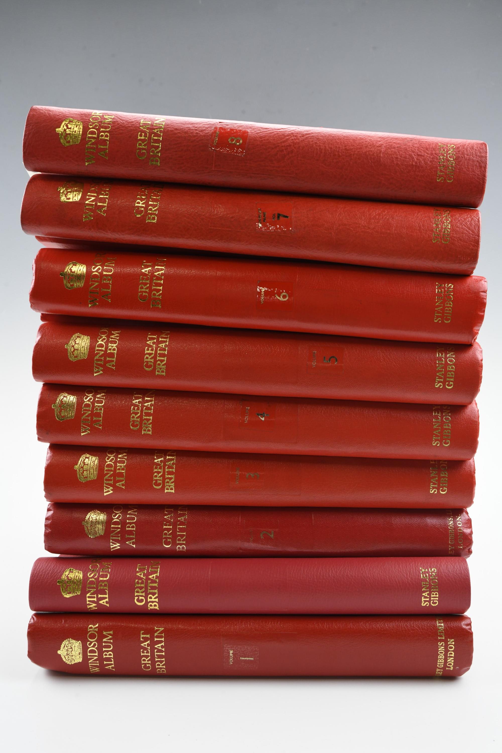 Nine Stanley Gibbons Windsor stamp albums, containing a large quantity ...