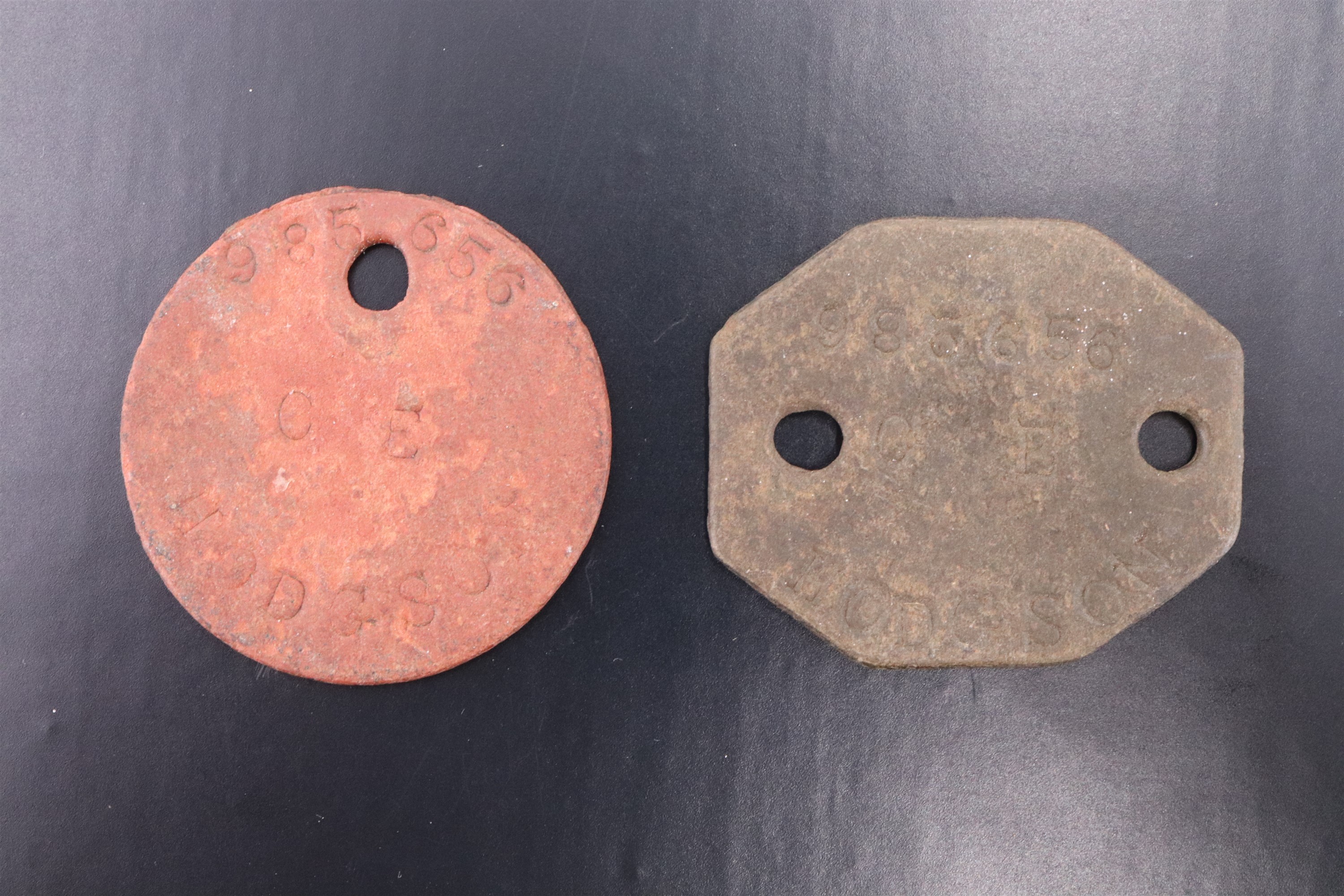 A set of Second World War British army fibre identity discs