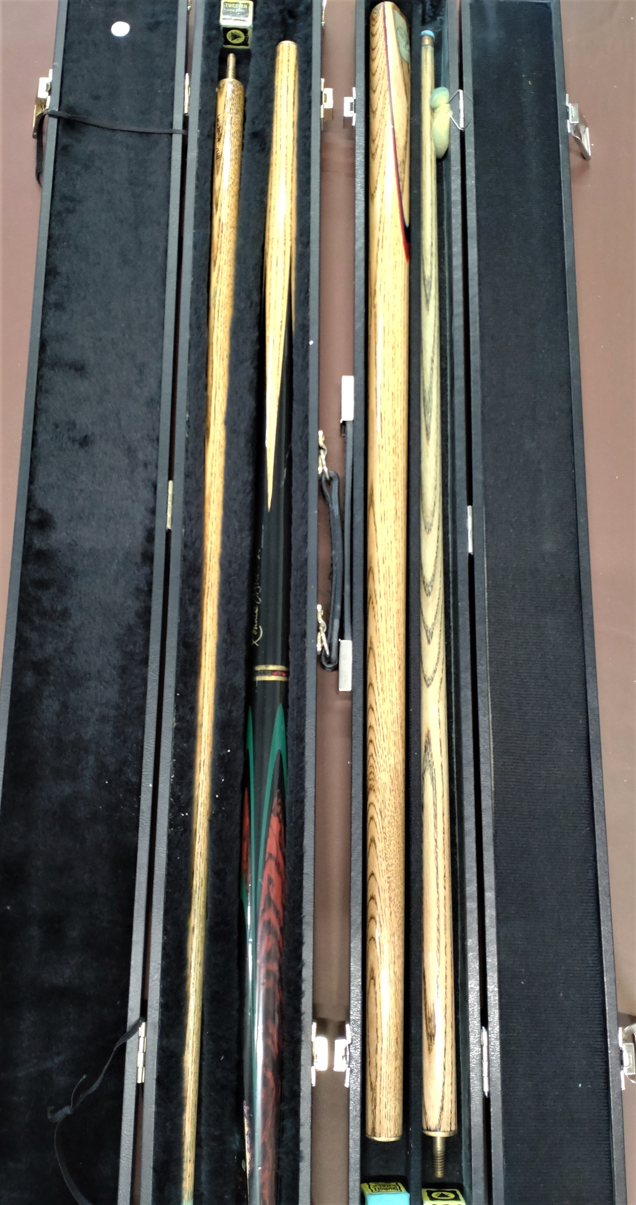 Two cased snooker cues, one 'Ronnie O'Sullivan' BCE custom cues, with ...