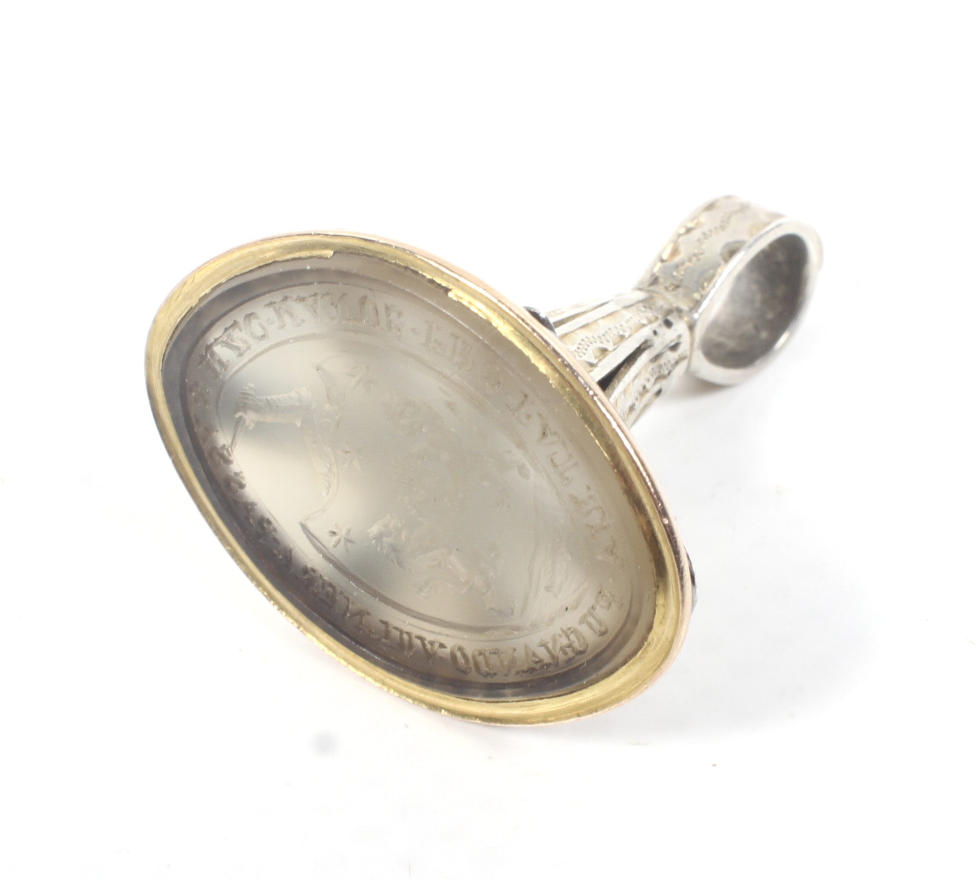 A 19th century gold and chalcedony marquise-shaped fob seal. The matrix ...