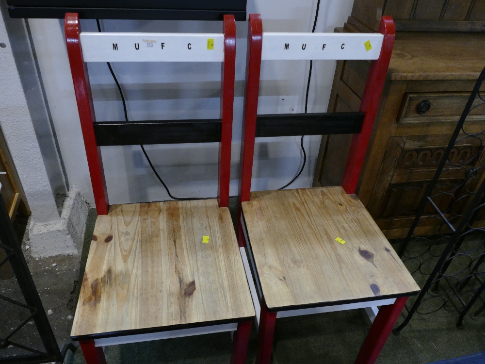 Pair of Manchester United football club decorated chairs