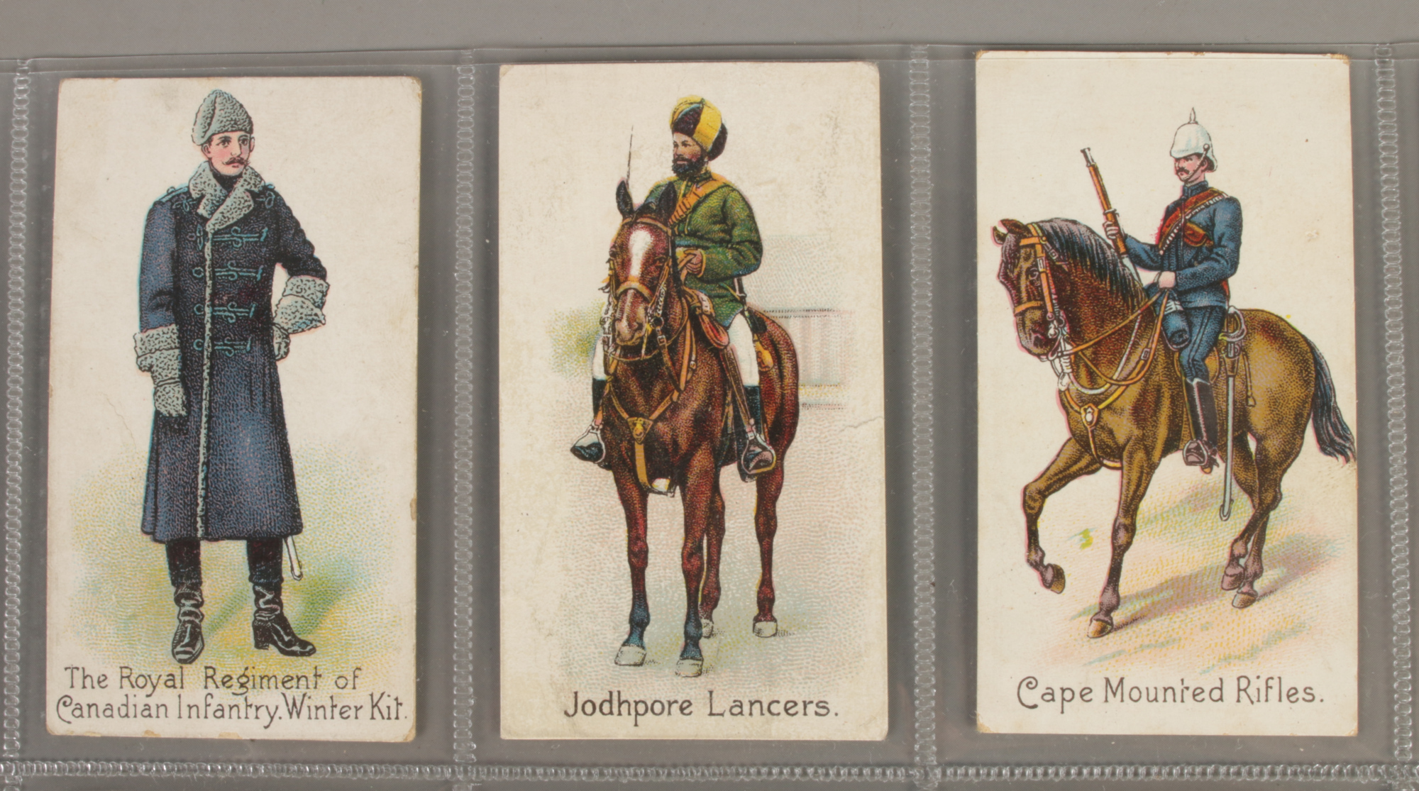Roberts Cigarettes; Colonial Troops. Twenty cigarette cards, some ...