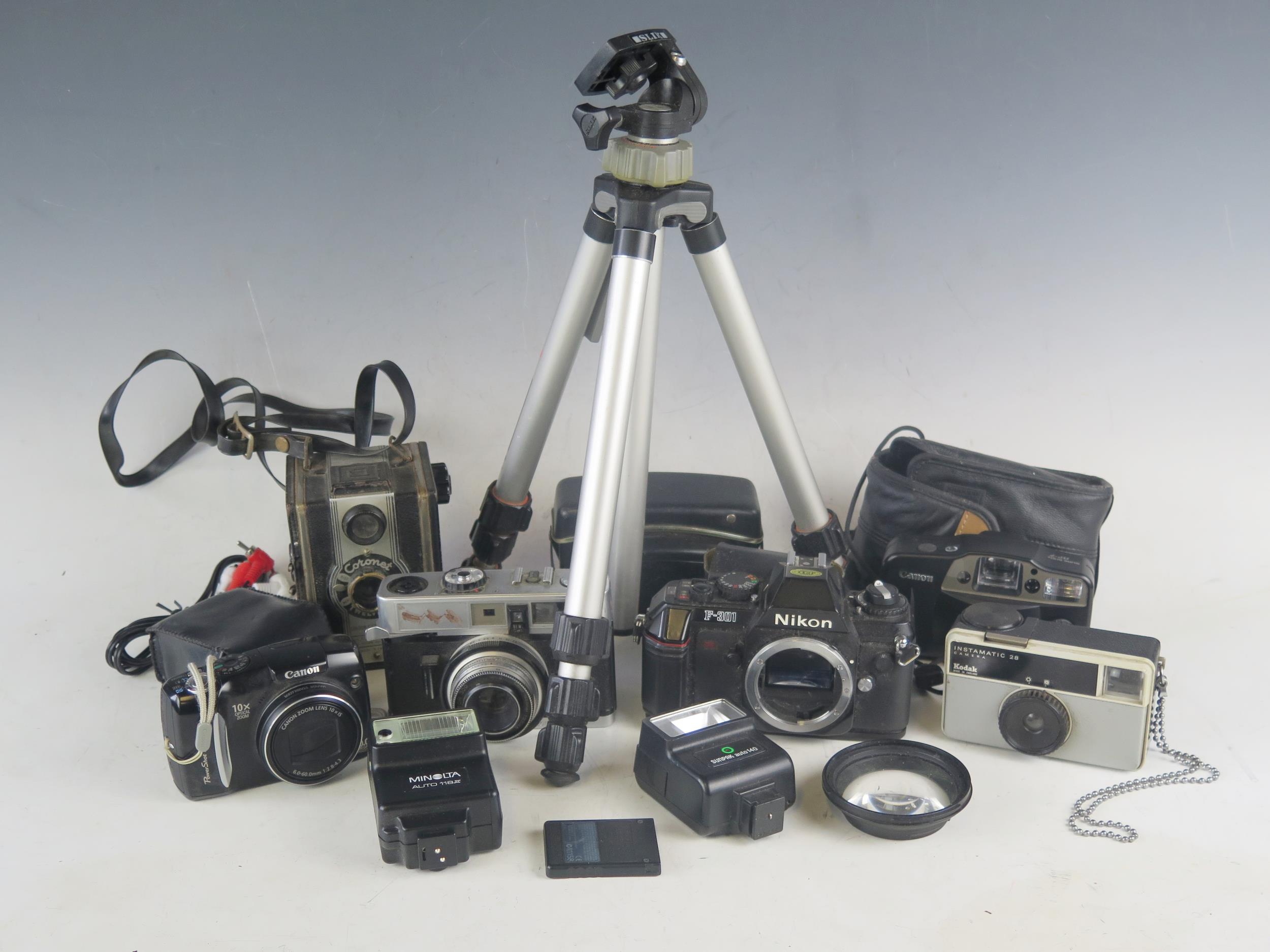 A Nikon F-301 35mm camera case, together with various assorted digital ...