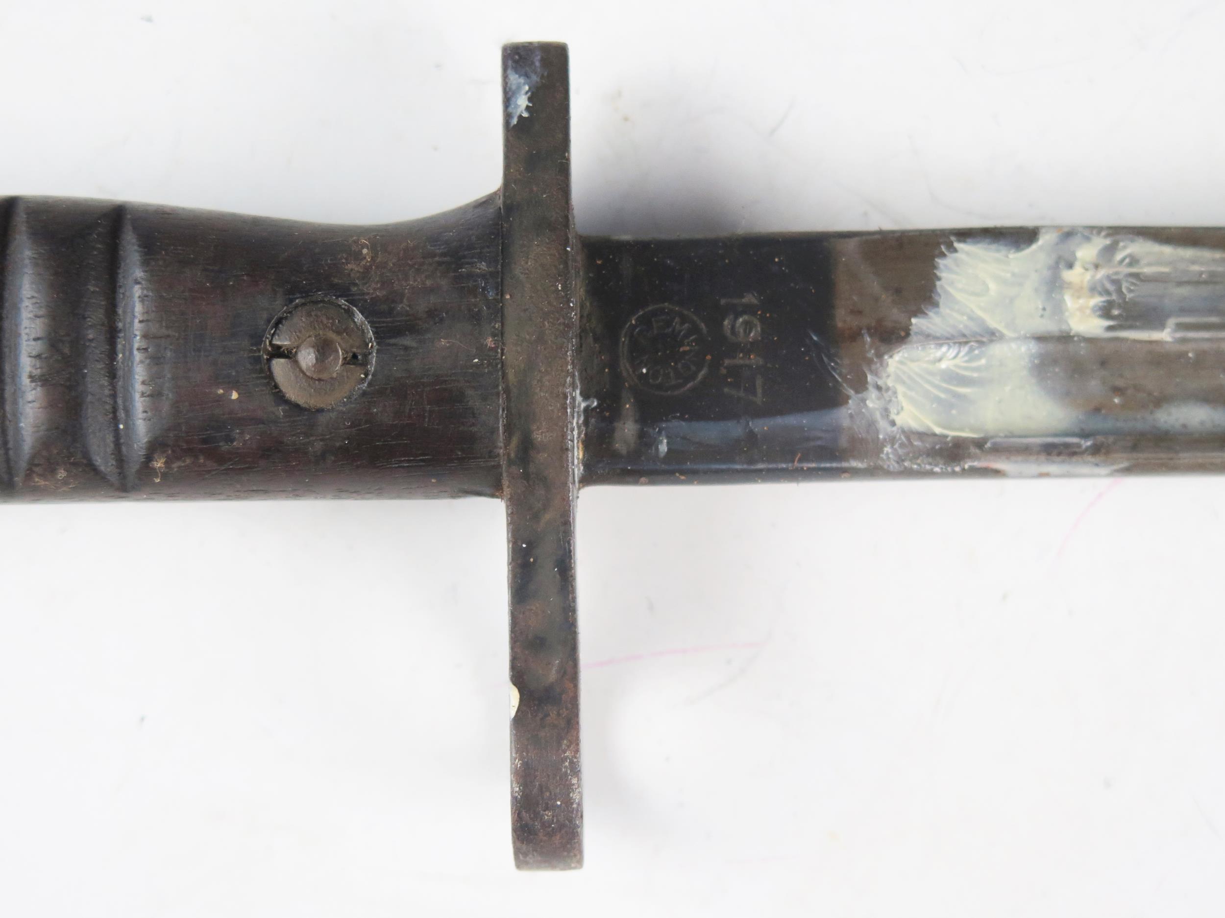 A World War I American issue bayonet, with 43cm fullered blade, stamped ...