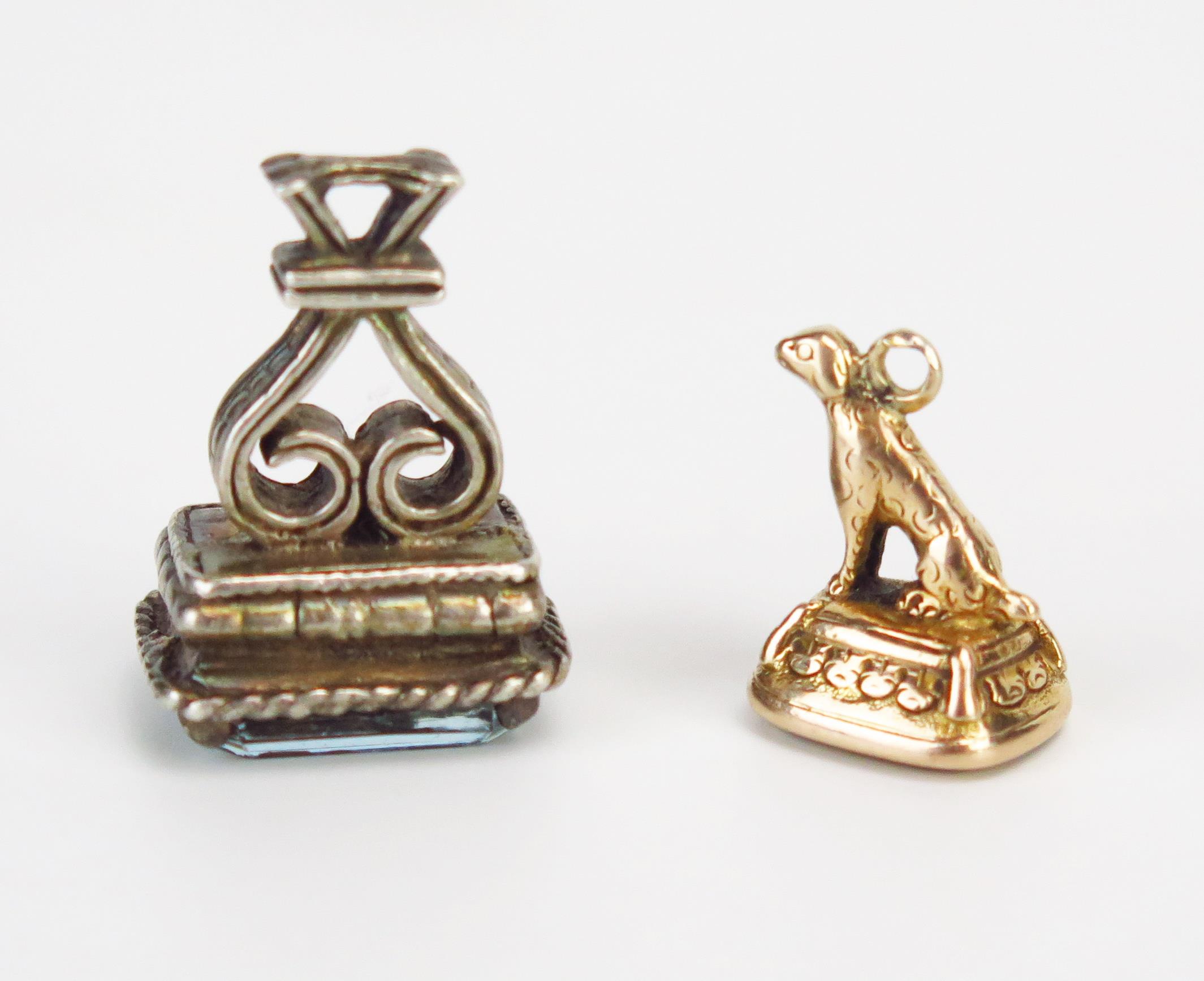 An Unmarked Gold Fob Seal with dog finial and engraved bloodstone ...