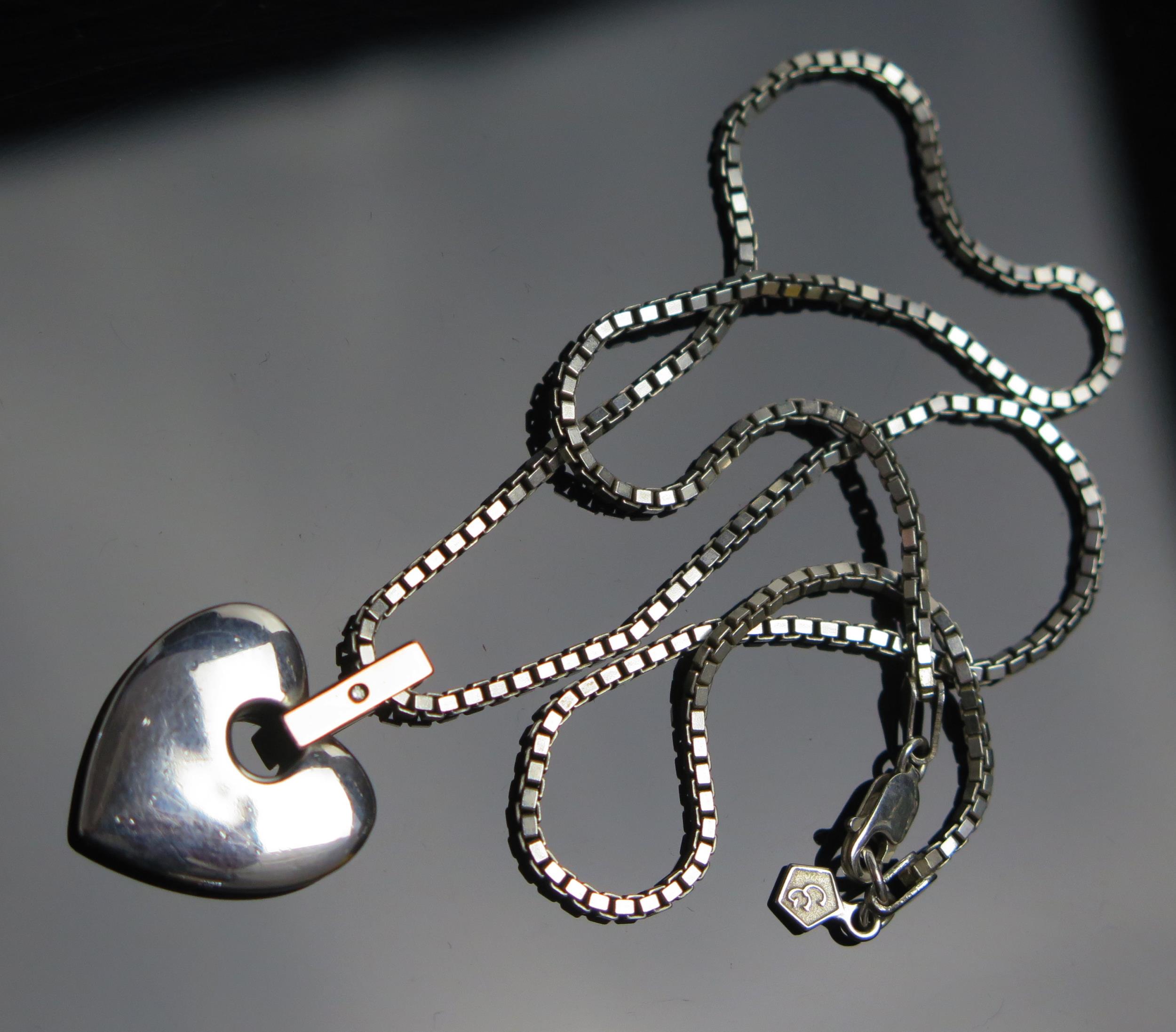 A Welsh Clogau Silver, 9ct Rose Gold and Diamond Heart Shaped 'Cariad ...