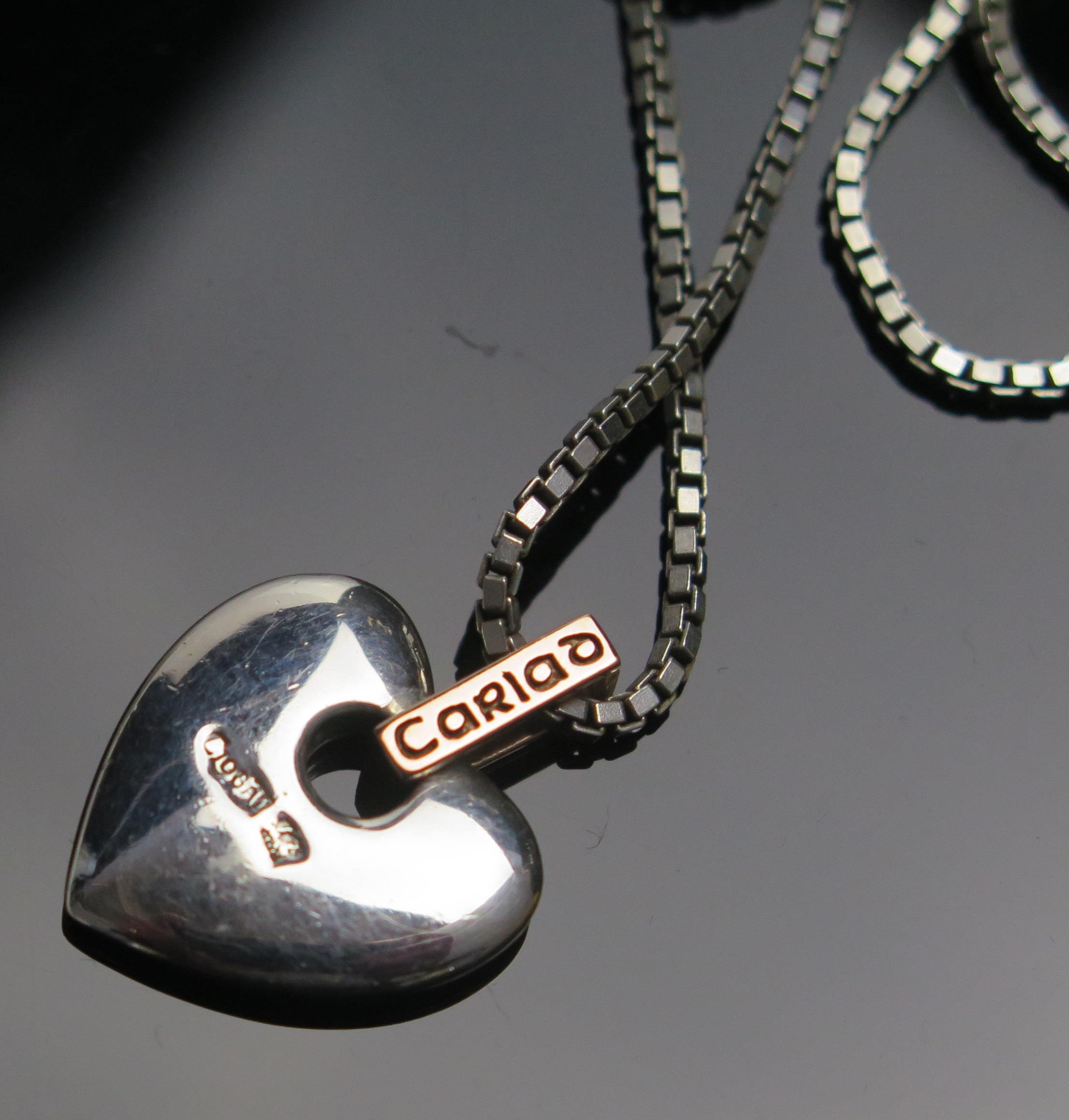 A Welsh Clogau Silver, 9ct Rose Gold and Diamond Heart Shaped 'Cariad ...