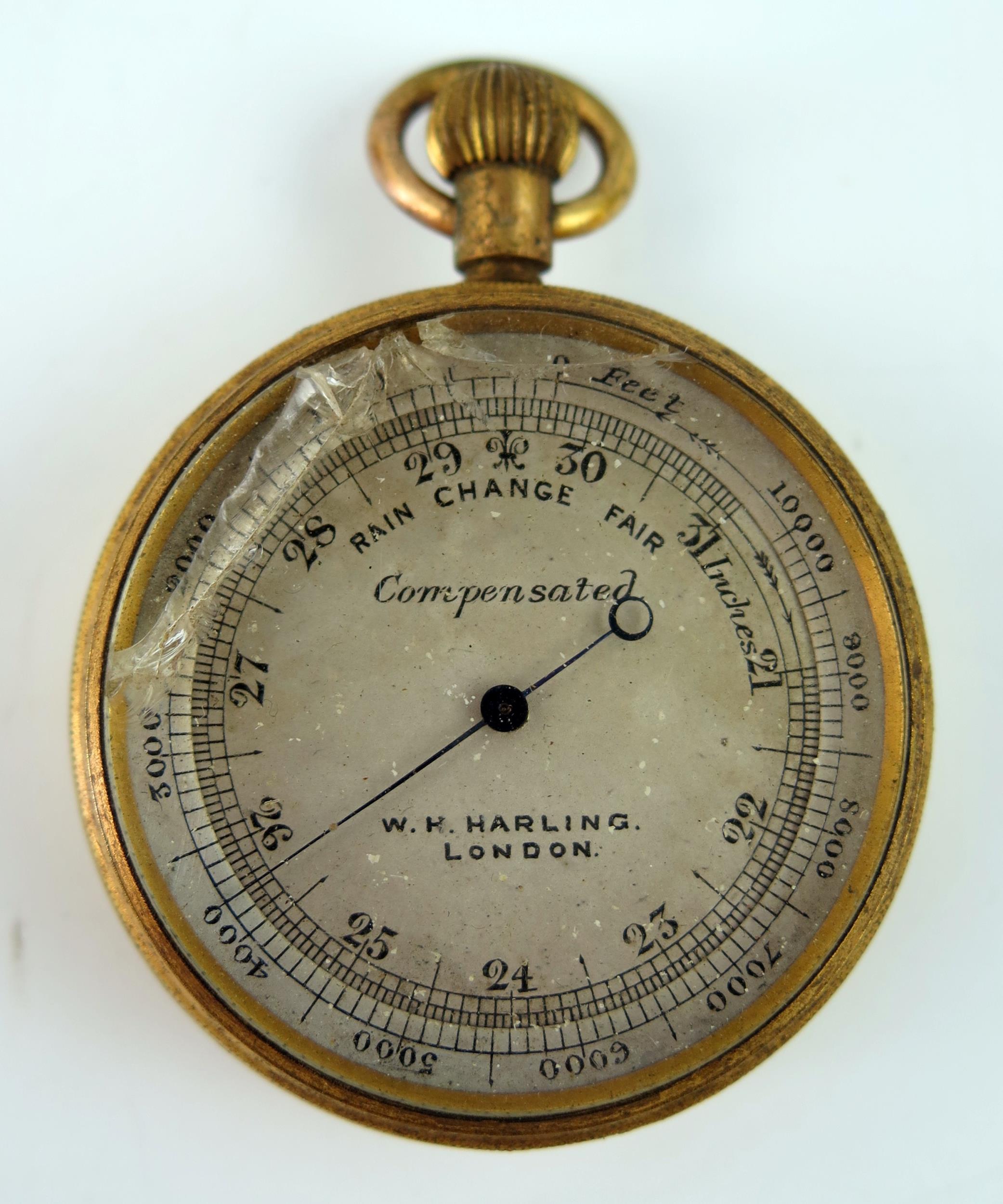 W H Harling, London, a lacquered brass pocket barometer contained in a ...