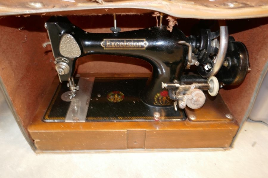 An old Excelsior sewing machine in fitted case