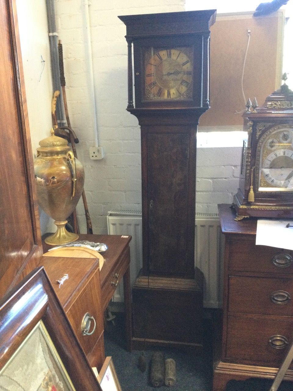 An eighteenth century oak longcase clock with movement by Thomas ...