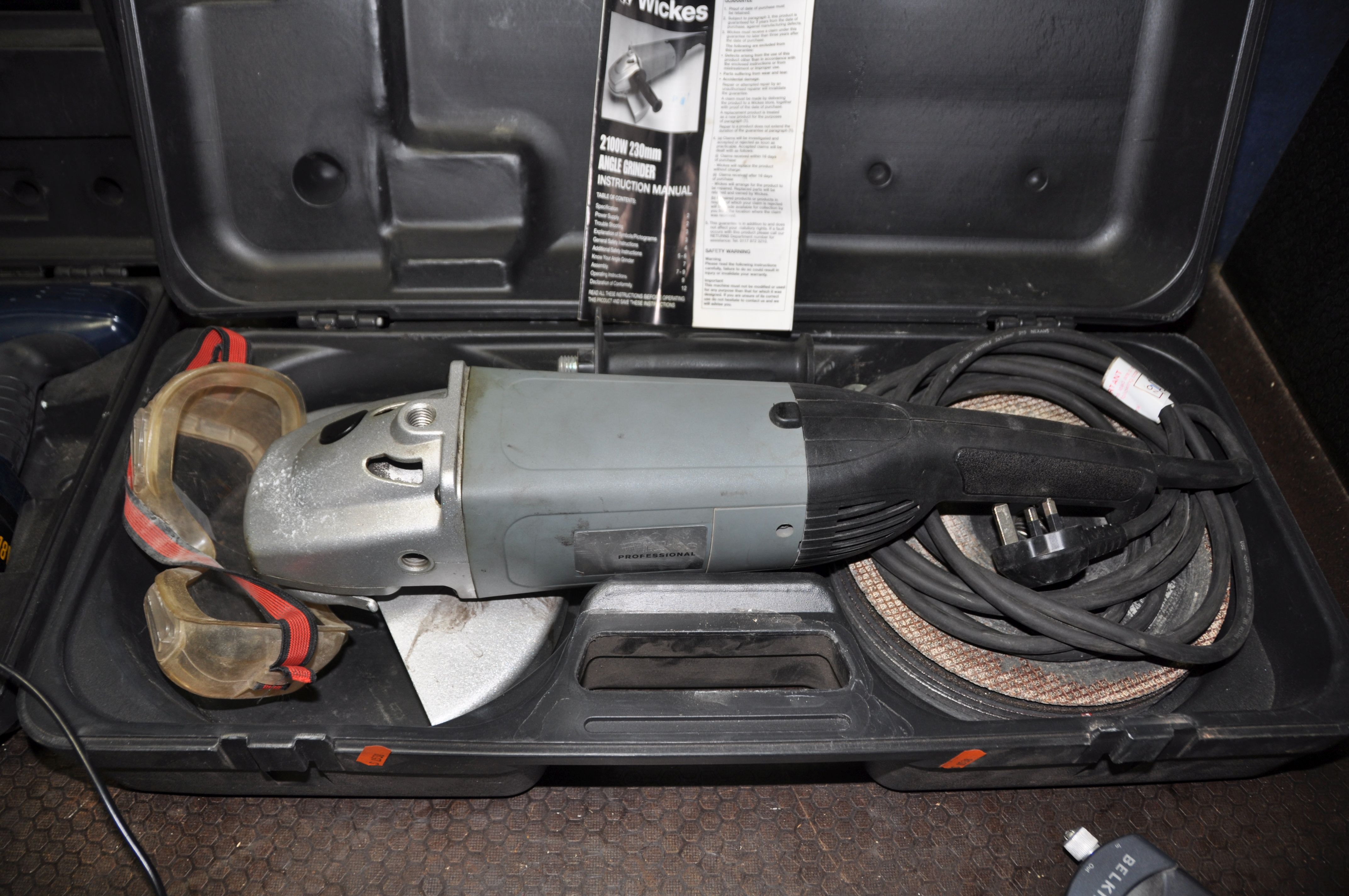 A WICKES PROFESSIONAL 9in ANGLE GRINDER IN CASE and a Performance Power ...