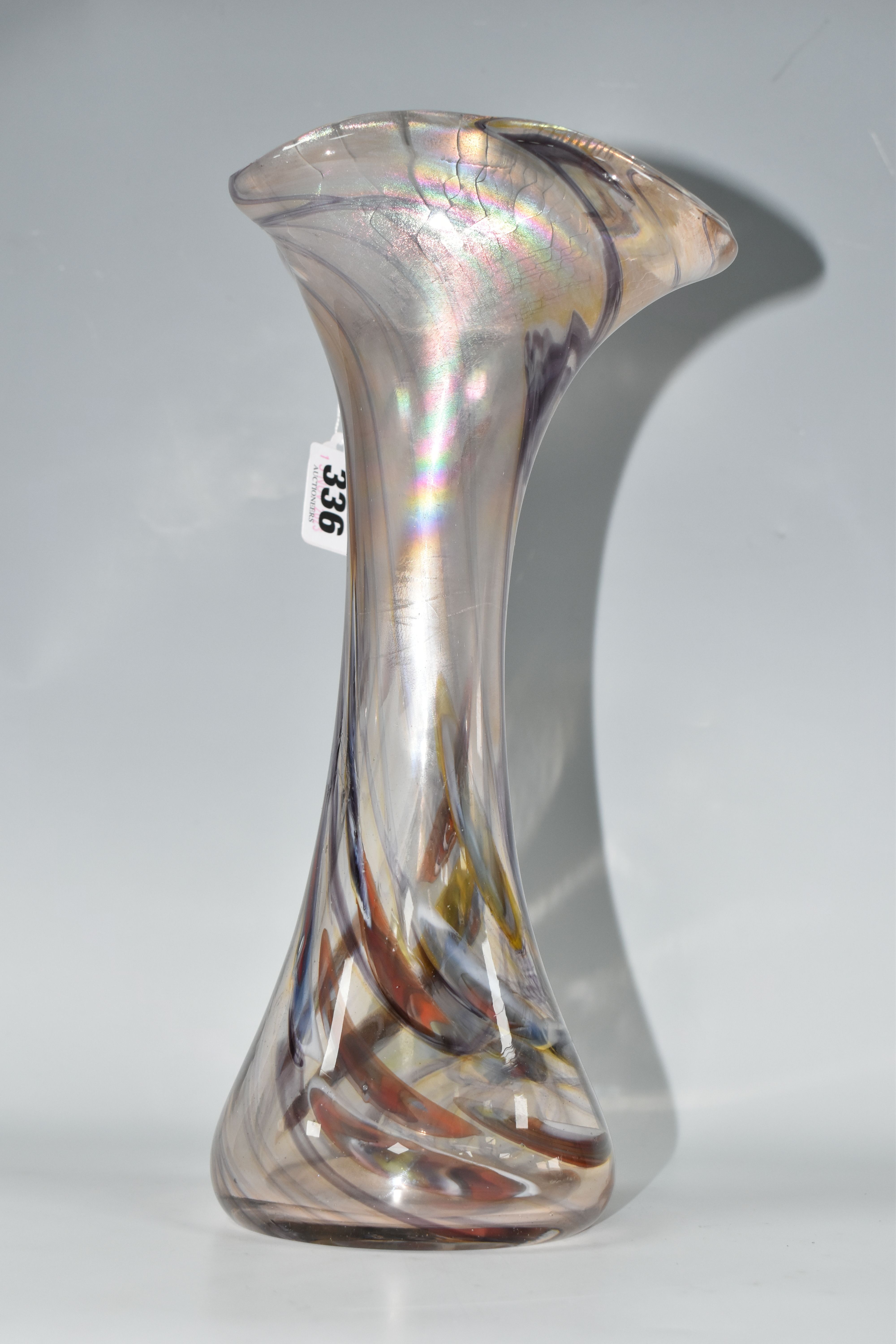 A JOHN DITCHFIELD GLASFORM STUDIO GLASS VASE, of extended fluid form ...
