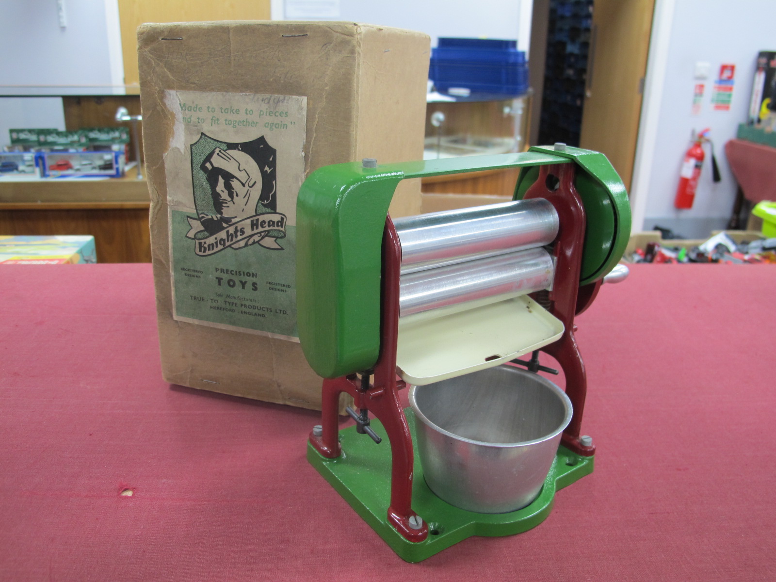 A Mid XX Century Knights Head Brand Toy Mangle, by Precision Toys, boxed.