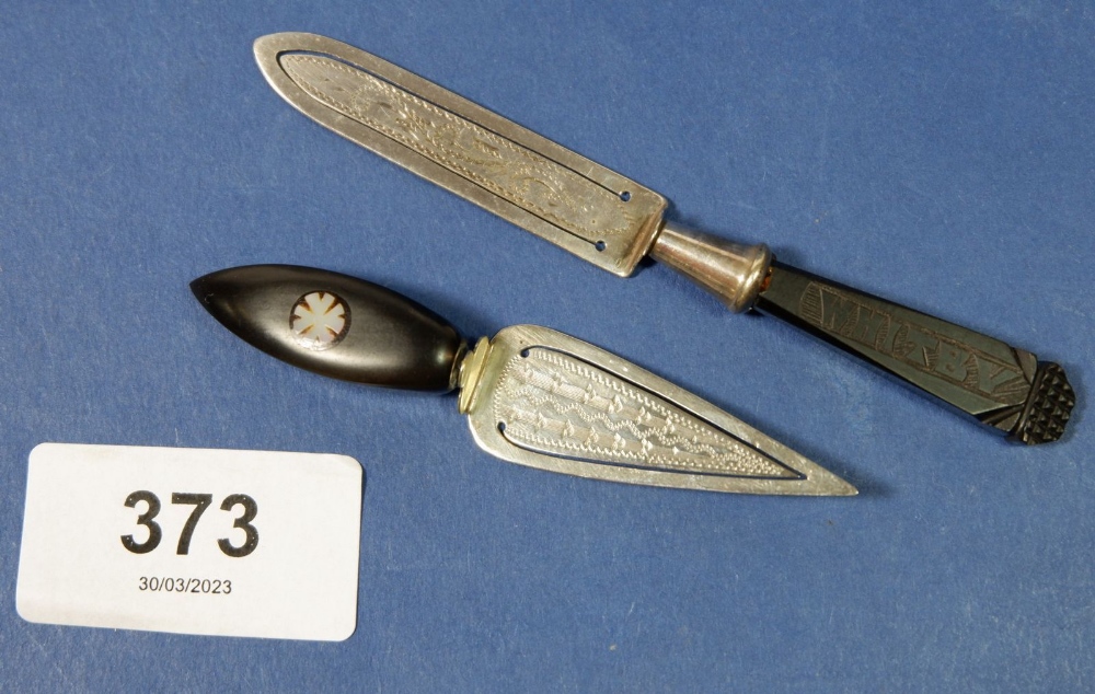 A Whitby jet handled white metal bookmark, 10cm and another trowel form ...