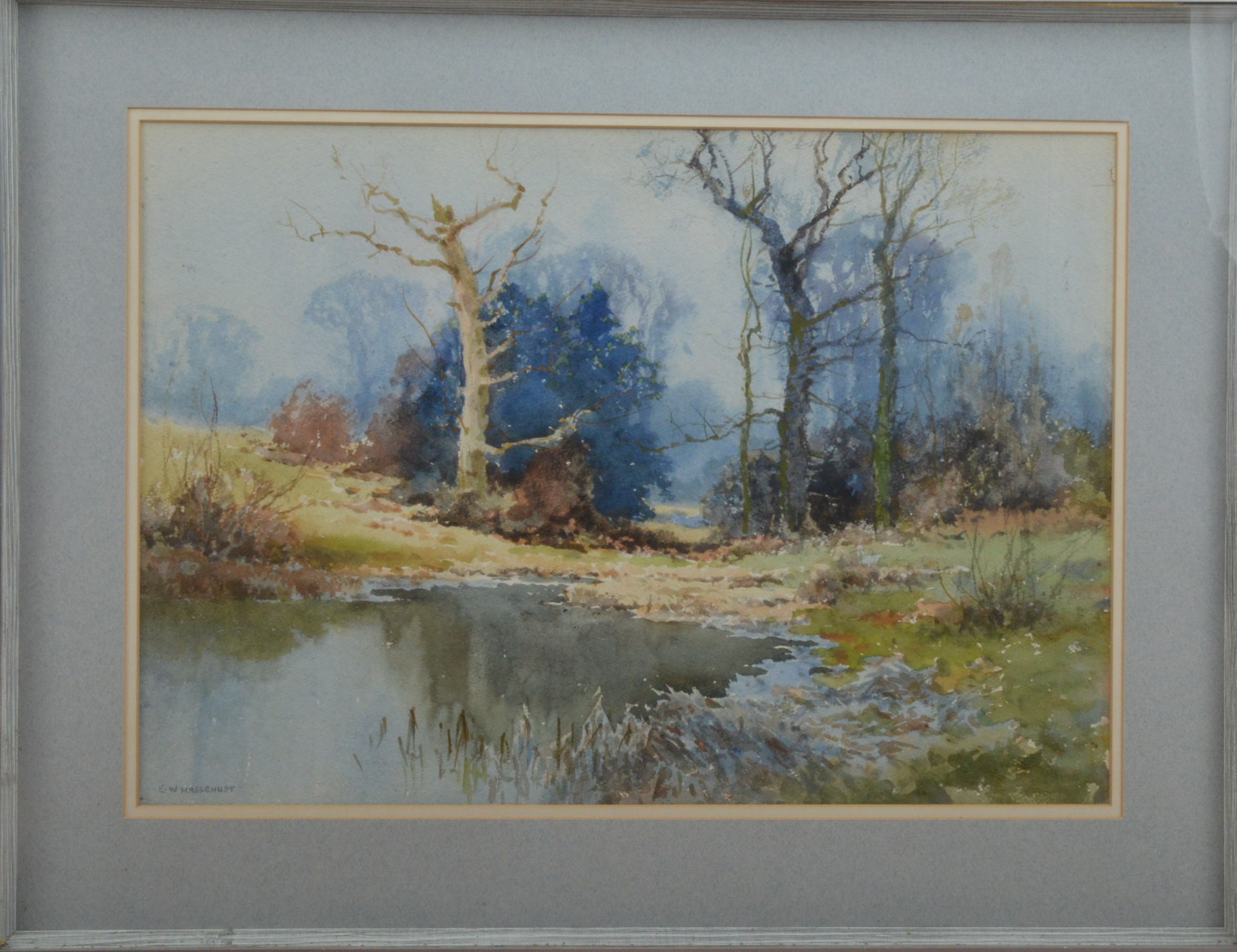 Ernest William Haslehurst (British 1866-1949), a pond in a forest ...