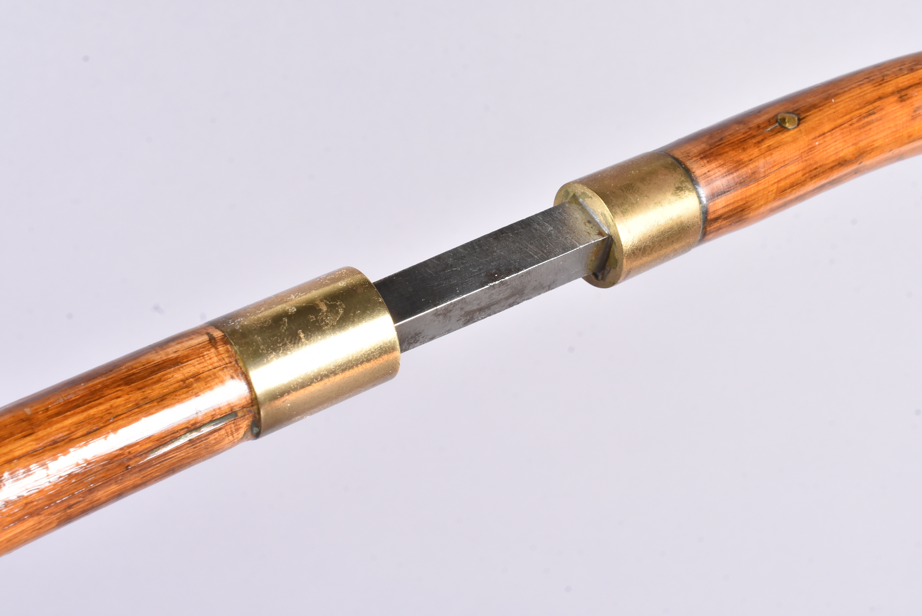An Antique sword stick, with four sided 75cm long blade