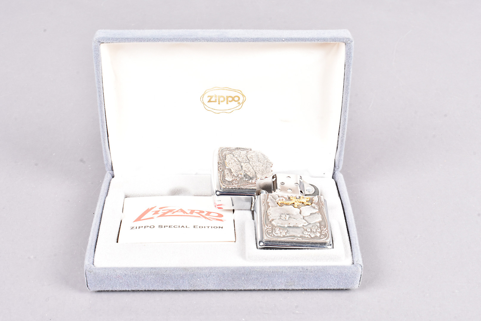 Lizard, 1996 Special Edition Zippo lighter, with rock design to the ...