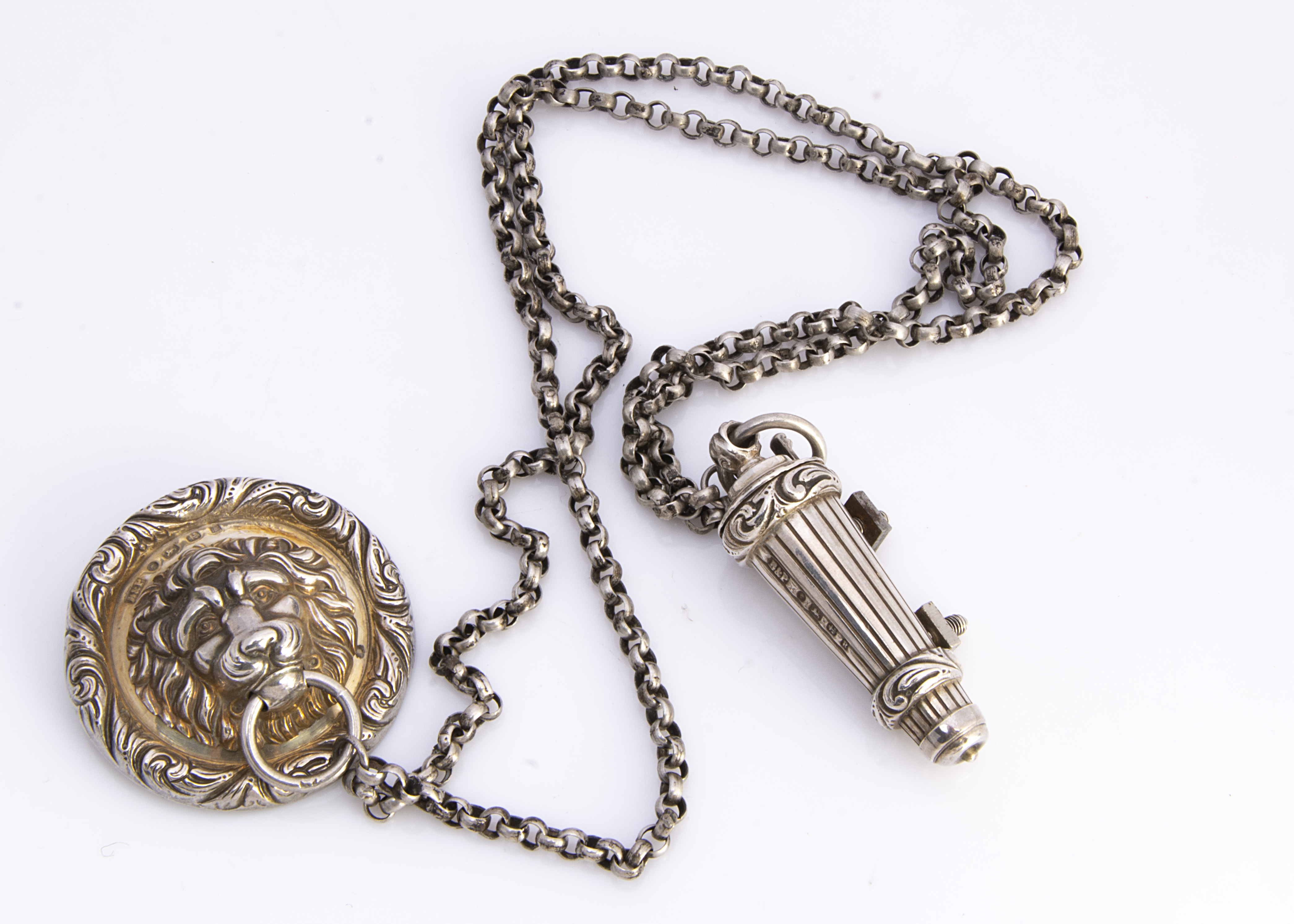 A Victorian silver military whistle on chain by BP, 55cm long and 2.65 ...