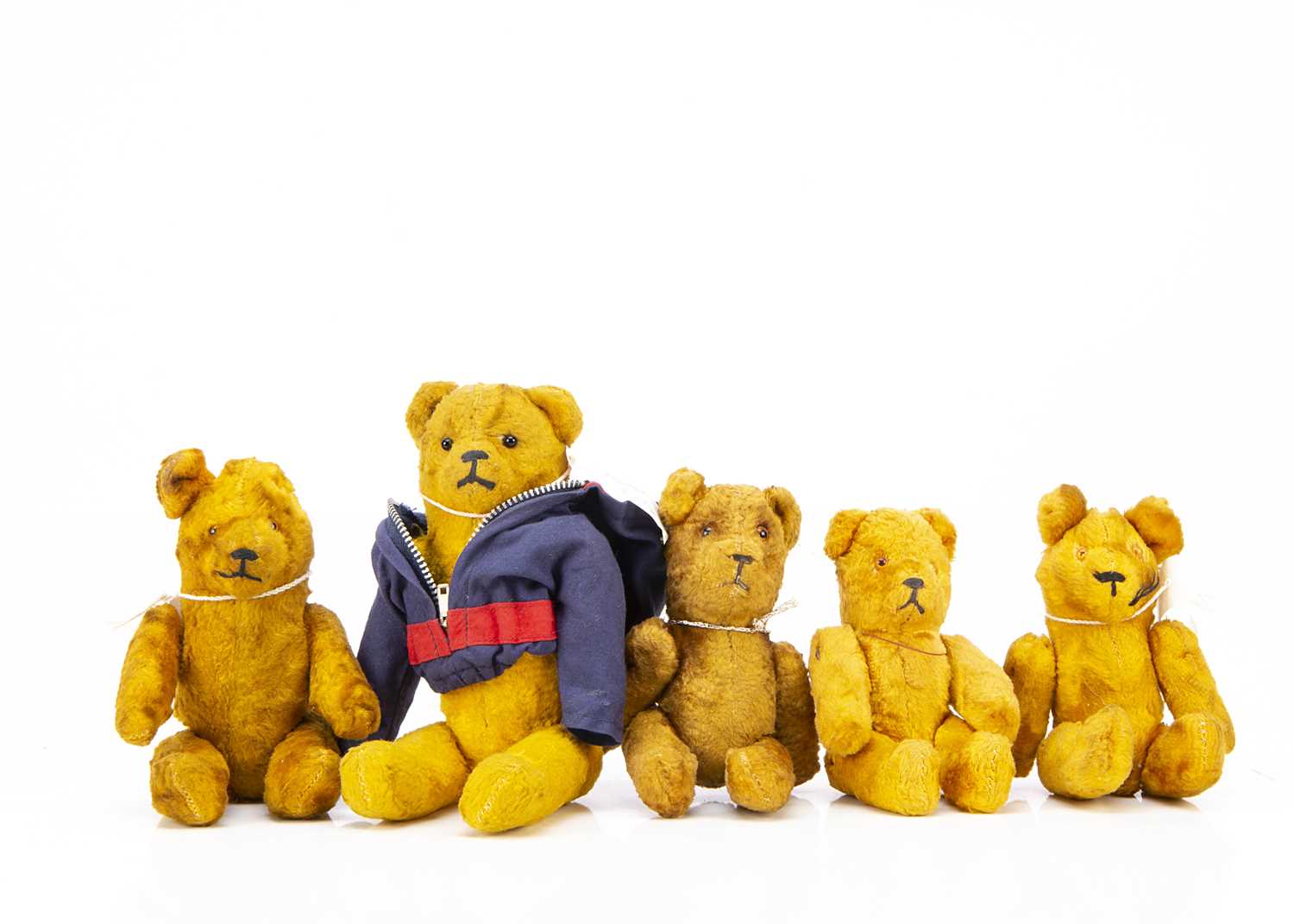 Five post-war small German Teddy Bears, golden artificial silk, all ...