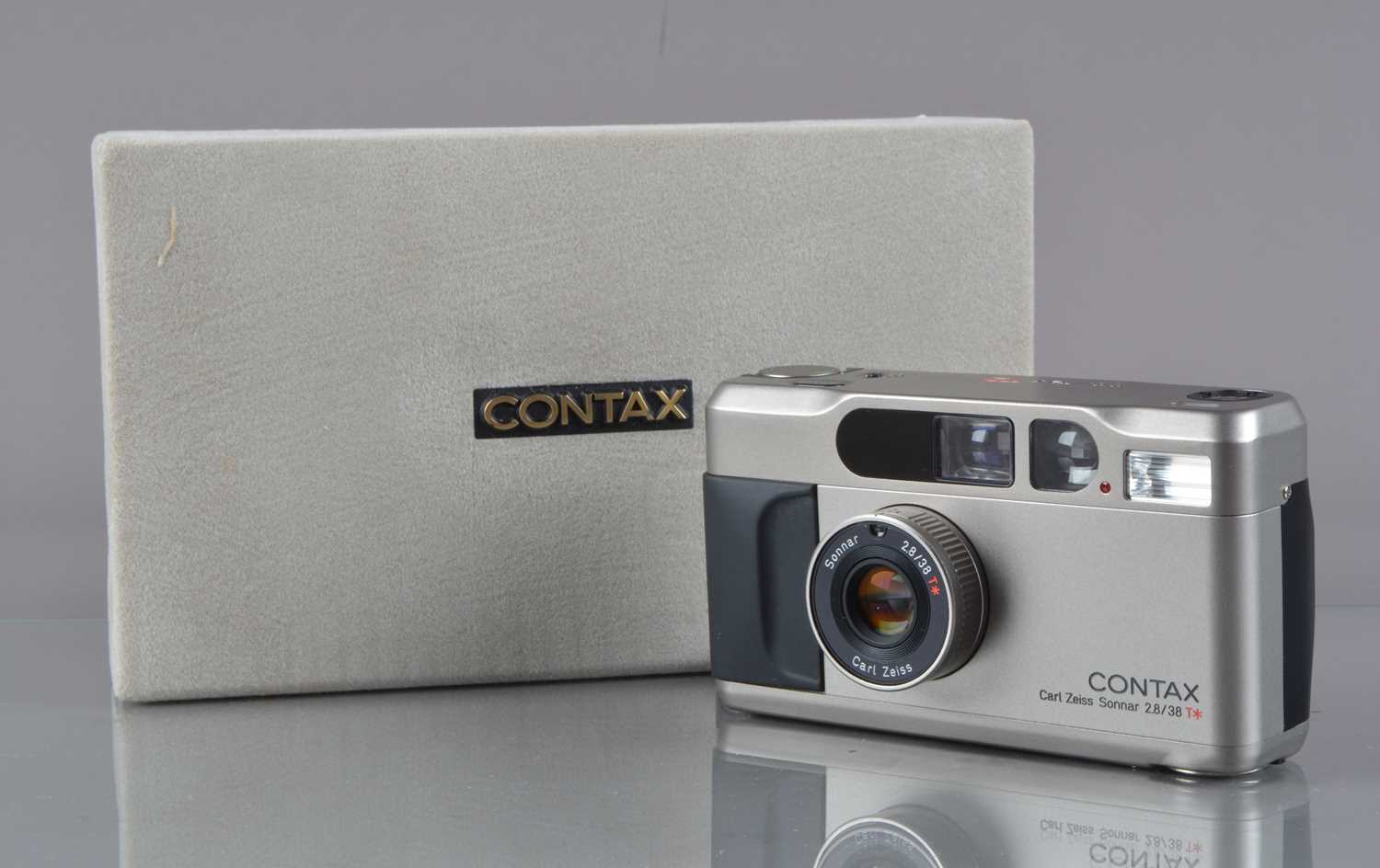 A Contax T2 Titan Silver Compact Camera, serial no 048844, powers up ...