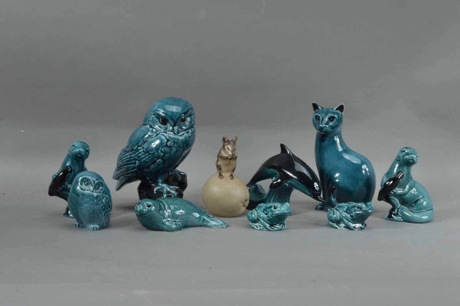 A collection of Poole pottery animals, including frogs, an owl, 18.5cm ...