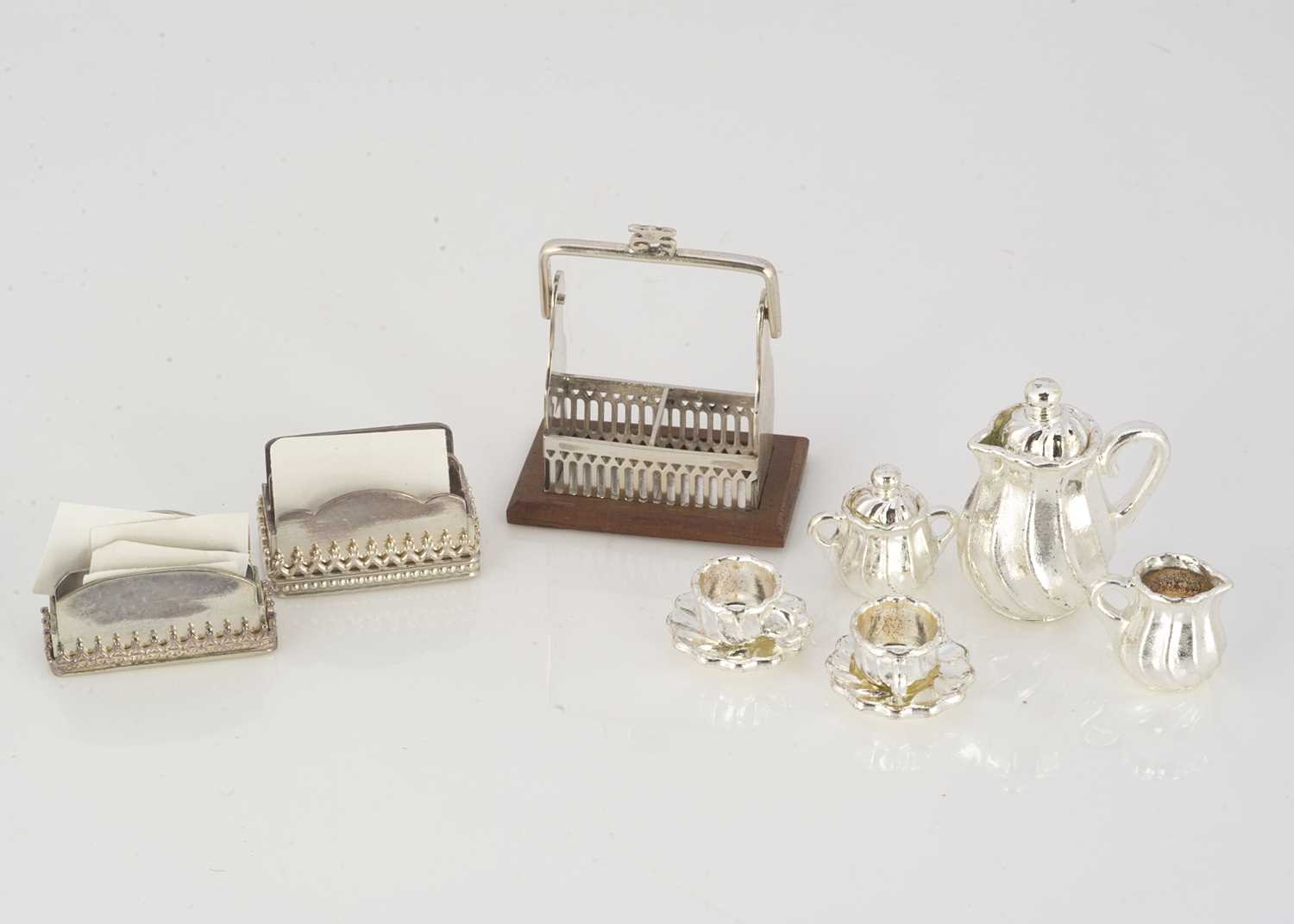 Simply Silver by Vic Pain dolls’ house silver chattels, comprising a ...