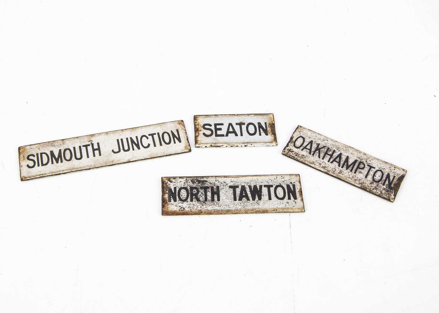Enamelled destination Plates, four with black lettering on a white ...